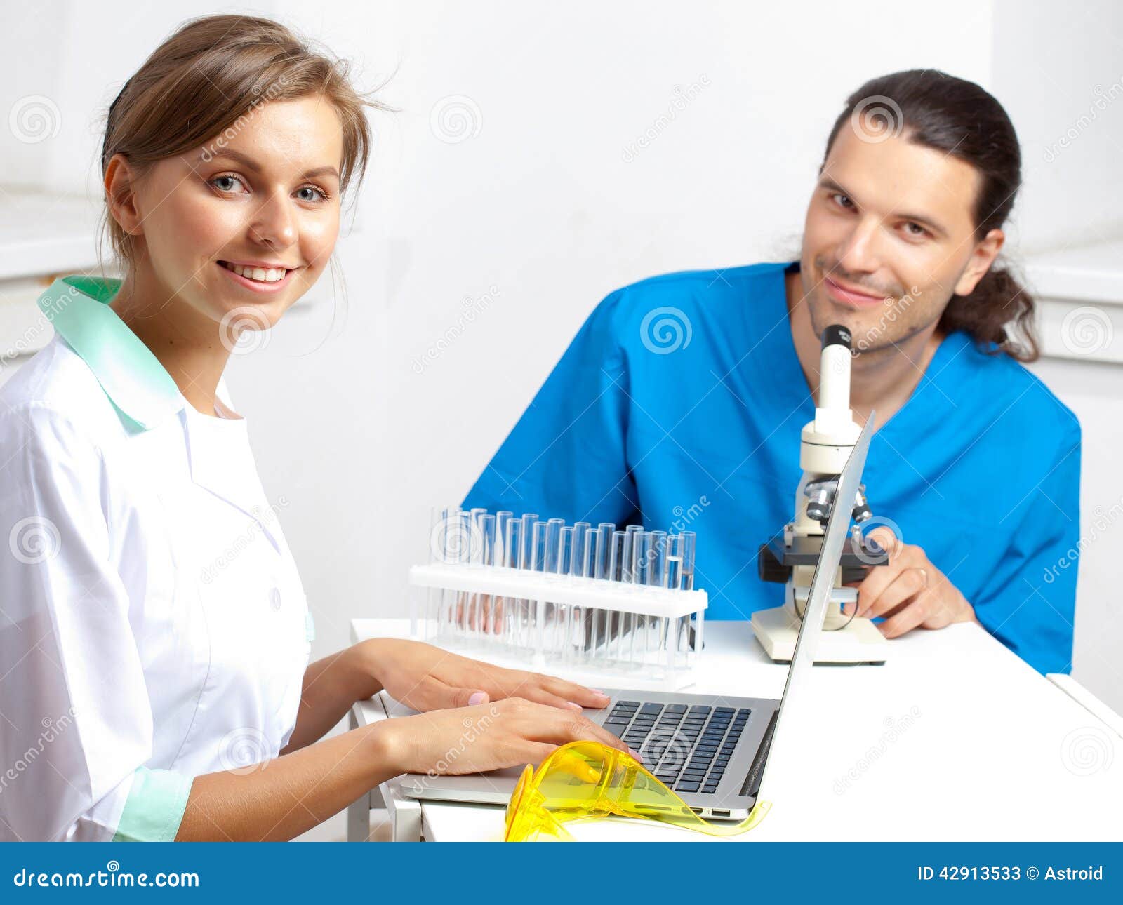Two Young Happy Medical People Stock Image - Image of beaker, doctor ...