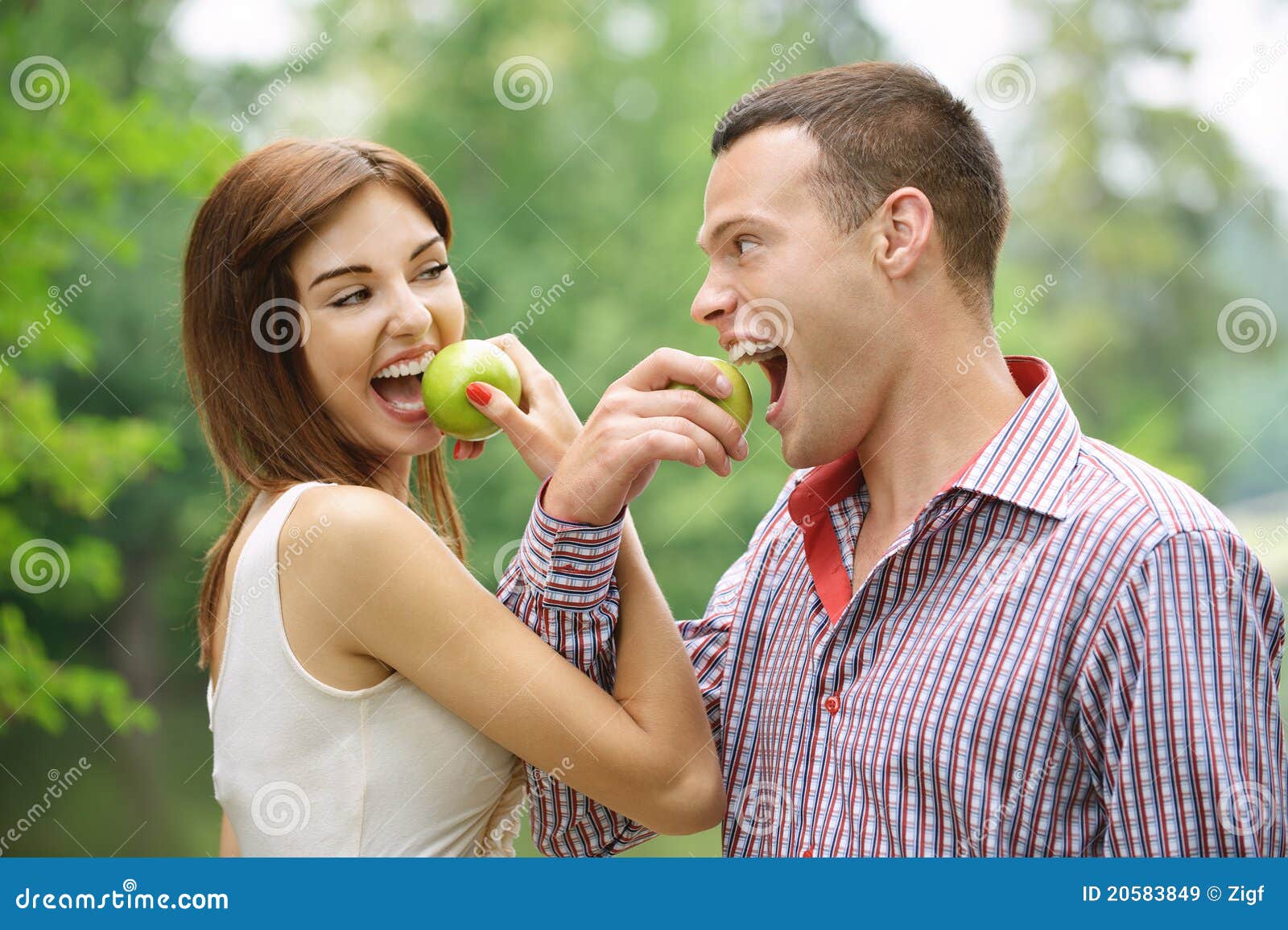Two Young Happy People Eating Stock Image - Image of healthy, caucasian ...
