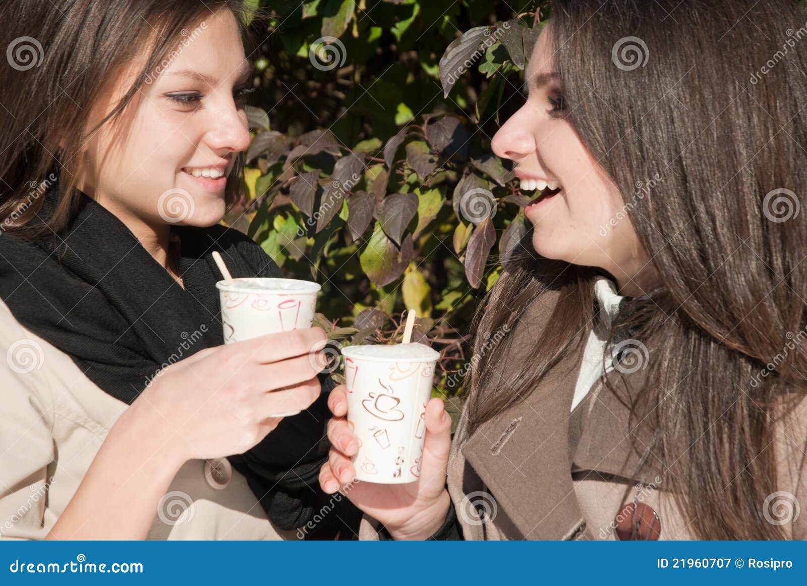 Two Young Happy Women Drinking Coffee and Tea Stock Image - Image of ...