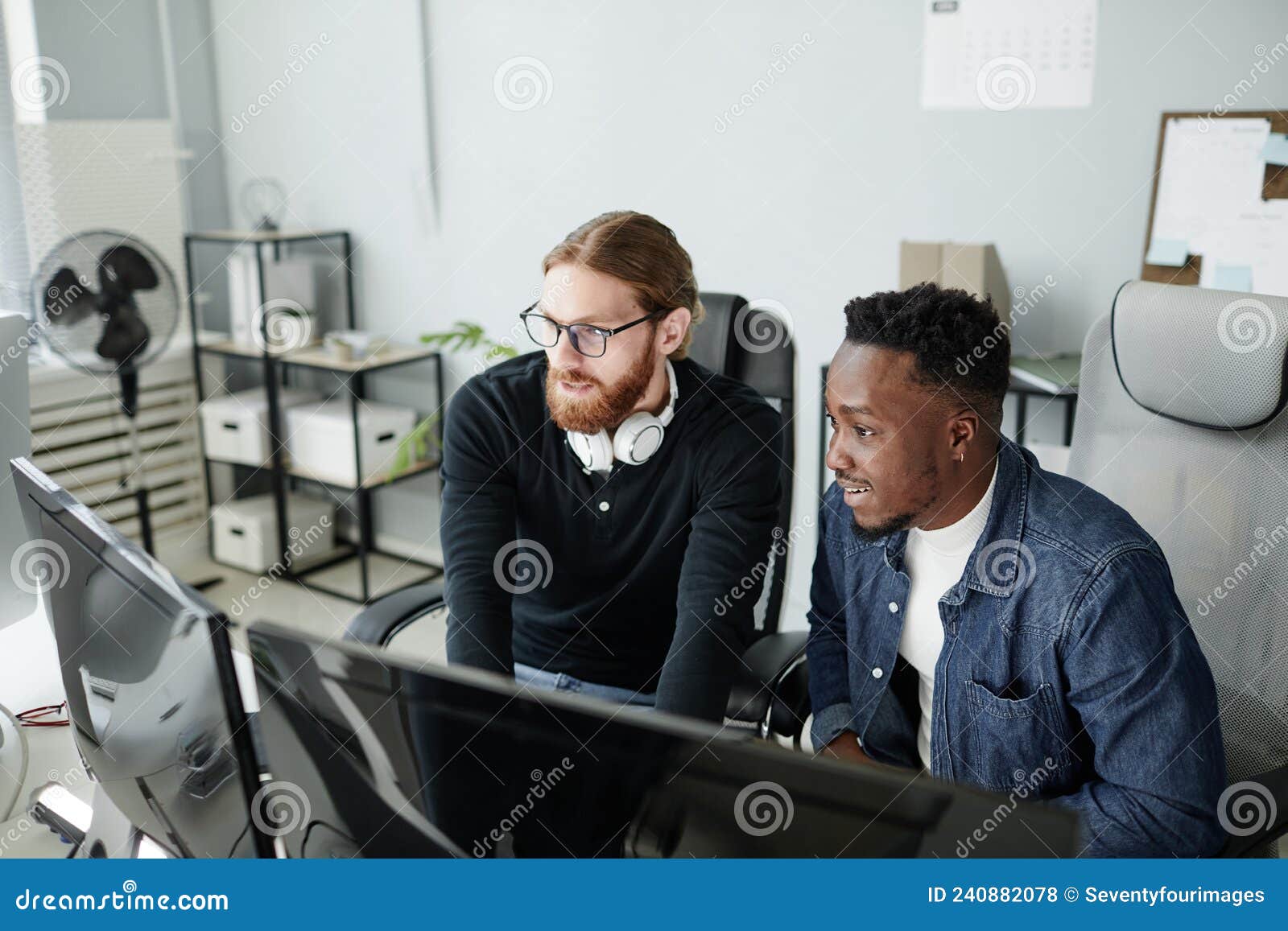 Two Young Intercultural Diversity Programmers Looking at Compute Screen ... Two Young Intercultural Diversity Programmers Looking at Compute Screen ...