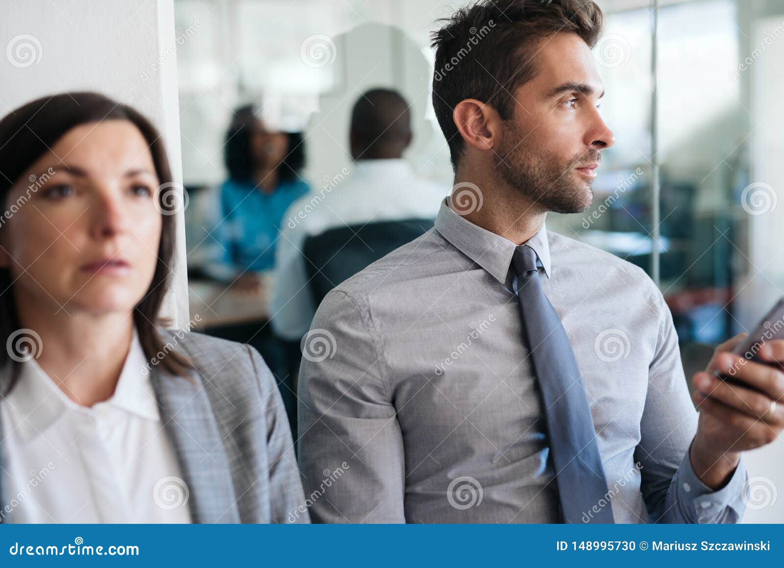 Two Young Job Applicants Waiting for Interviews in an Office Stock ...
