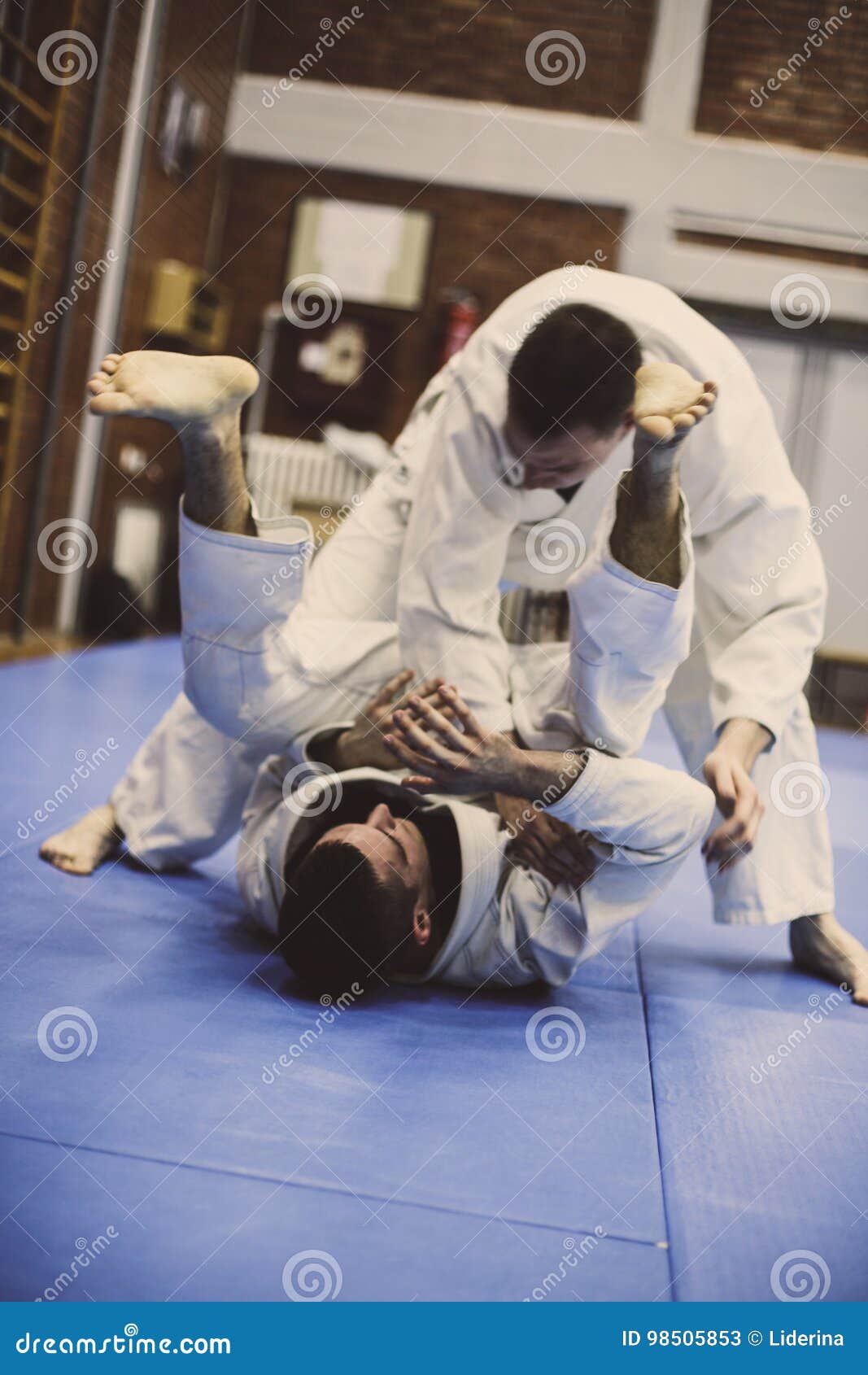 Two Young Males Practicing Judo Together. Stock Image - Image of ...