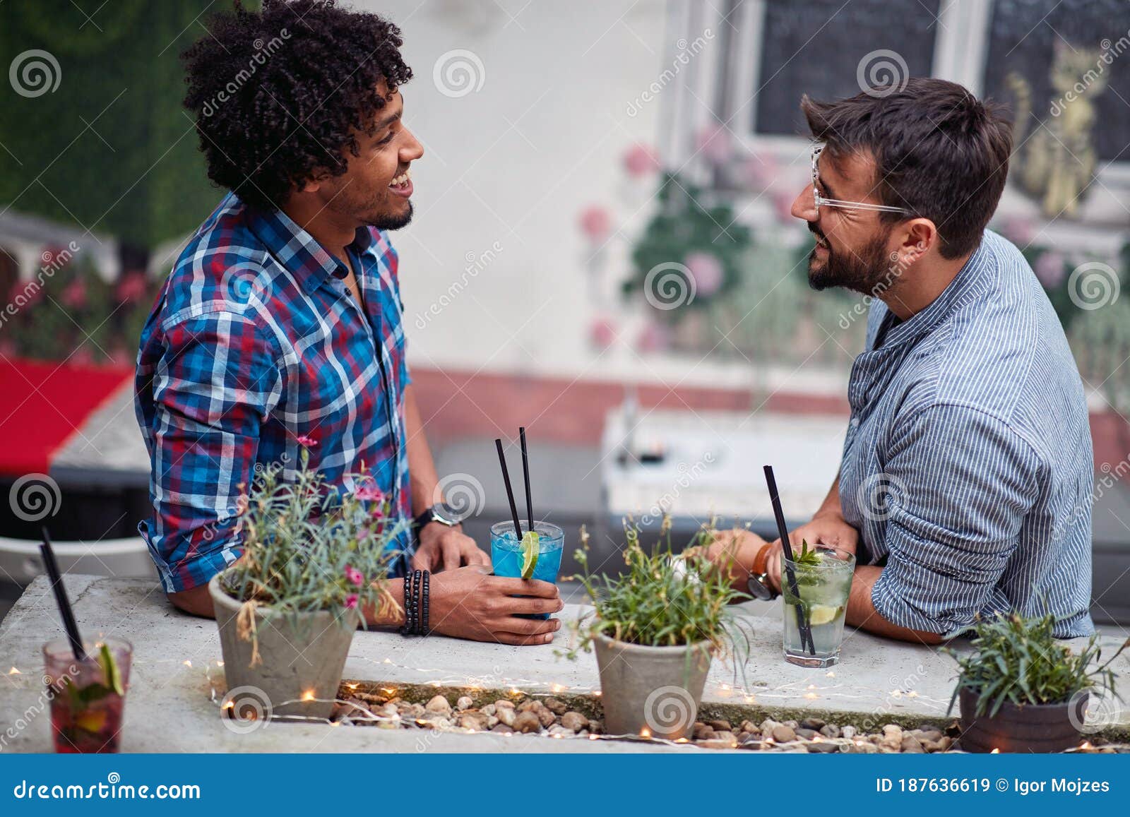 Two Young Man in Friendly Conversation Stock Image - Image of hangout ...