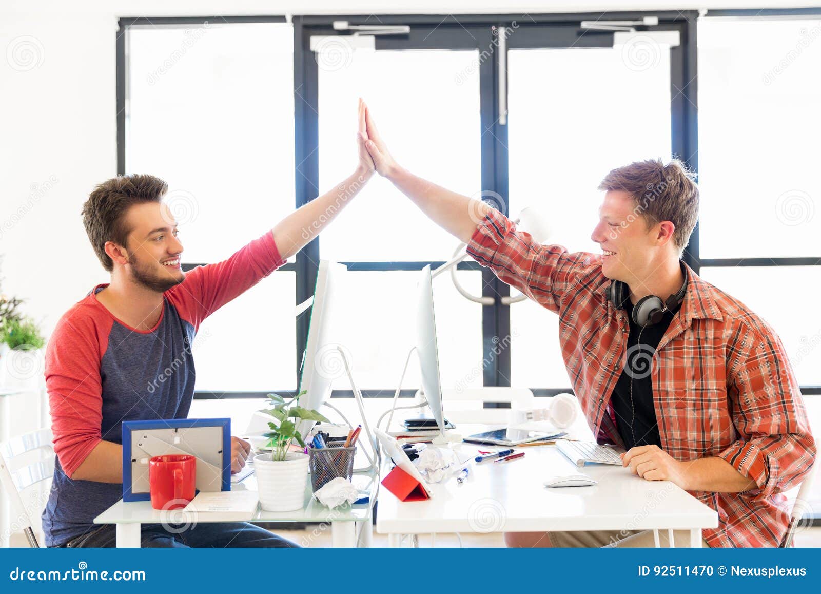Two Young Man in Office Clapping Their Hands Stock Photo - Image of ...