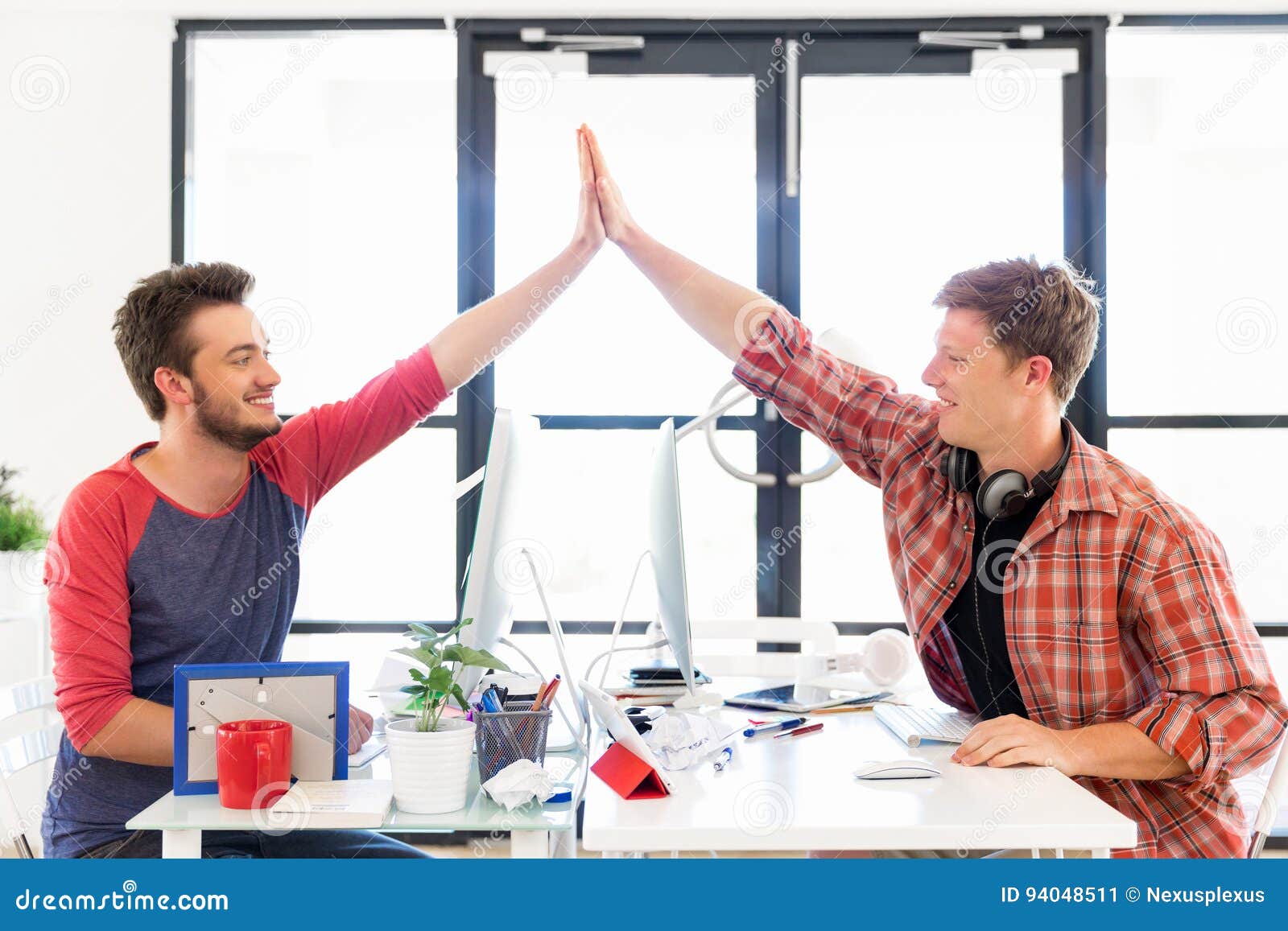 Two Young Man in Office Clapping Their Hands Stock Image - Image of ...