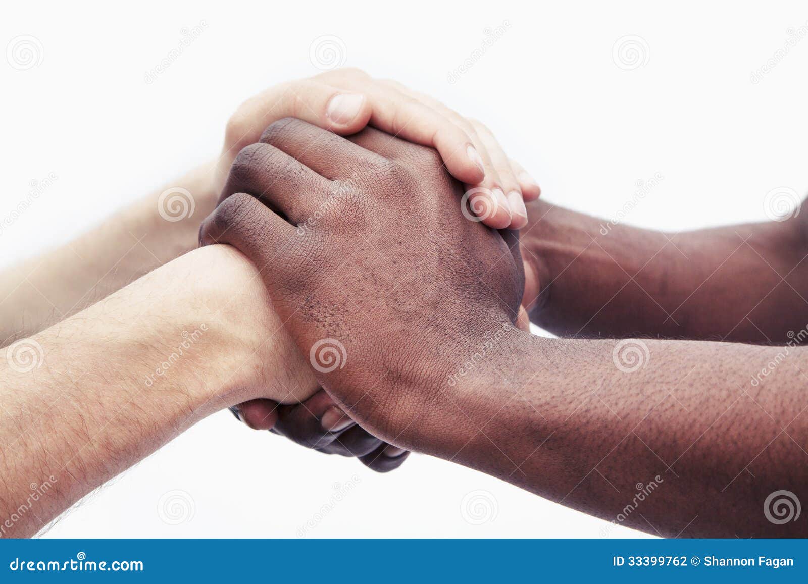 Two Young Men Clasping Each Others Hands, Close-up, Studio Shot Stock ...