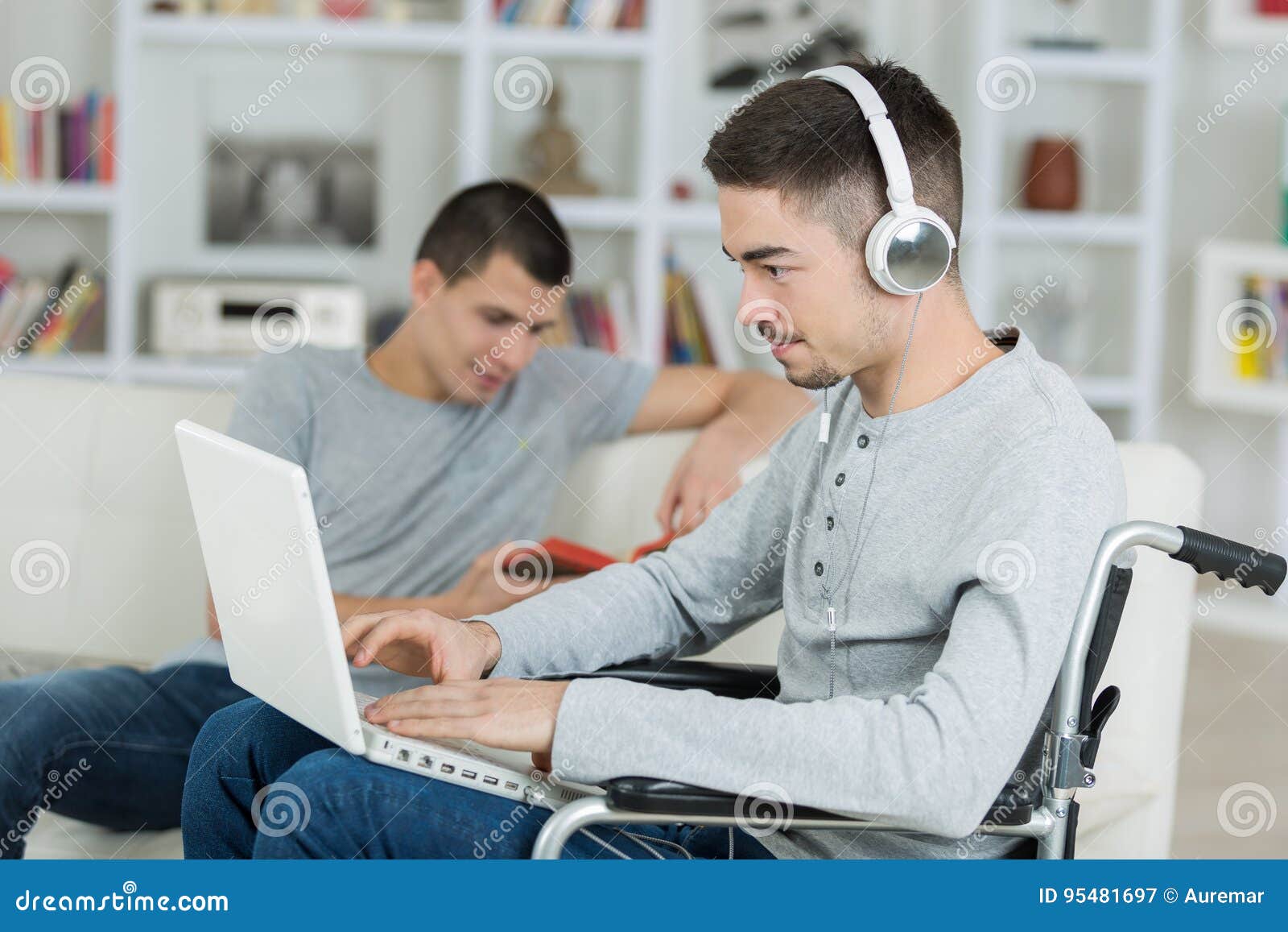Two Young Men Doing Their Homework in Living Room Stock Image - Image ...