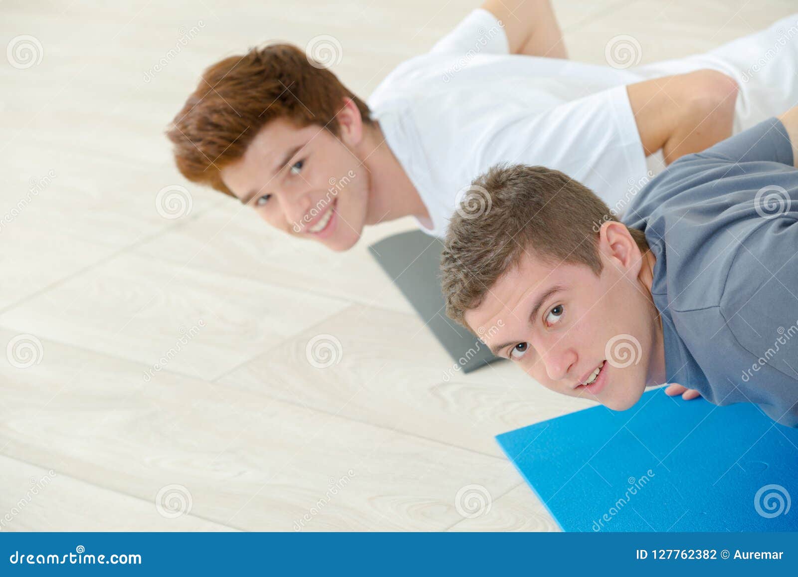 Two Young Men in Gym Working Out Stock Photo - Image of muscular ...