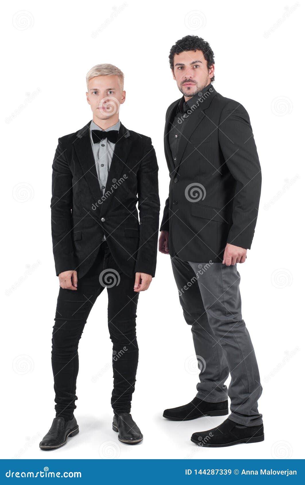 Two young men in jackets stock image. Image of serious - 144287339