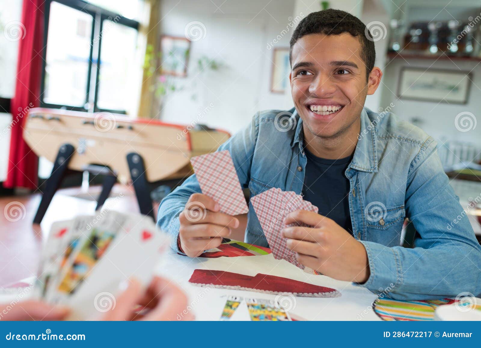 Two Young Men Playing Cards Spending Time at Home Stock Image - Image ...