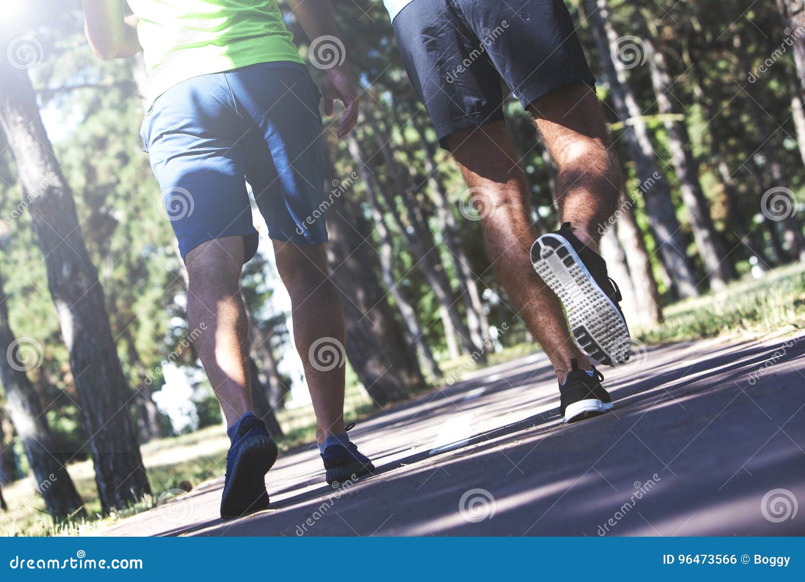Two Young Men Running in the Park. Stock Photo - Image of jogging ...