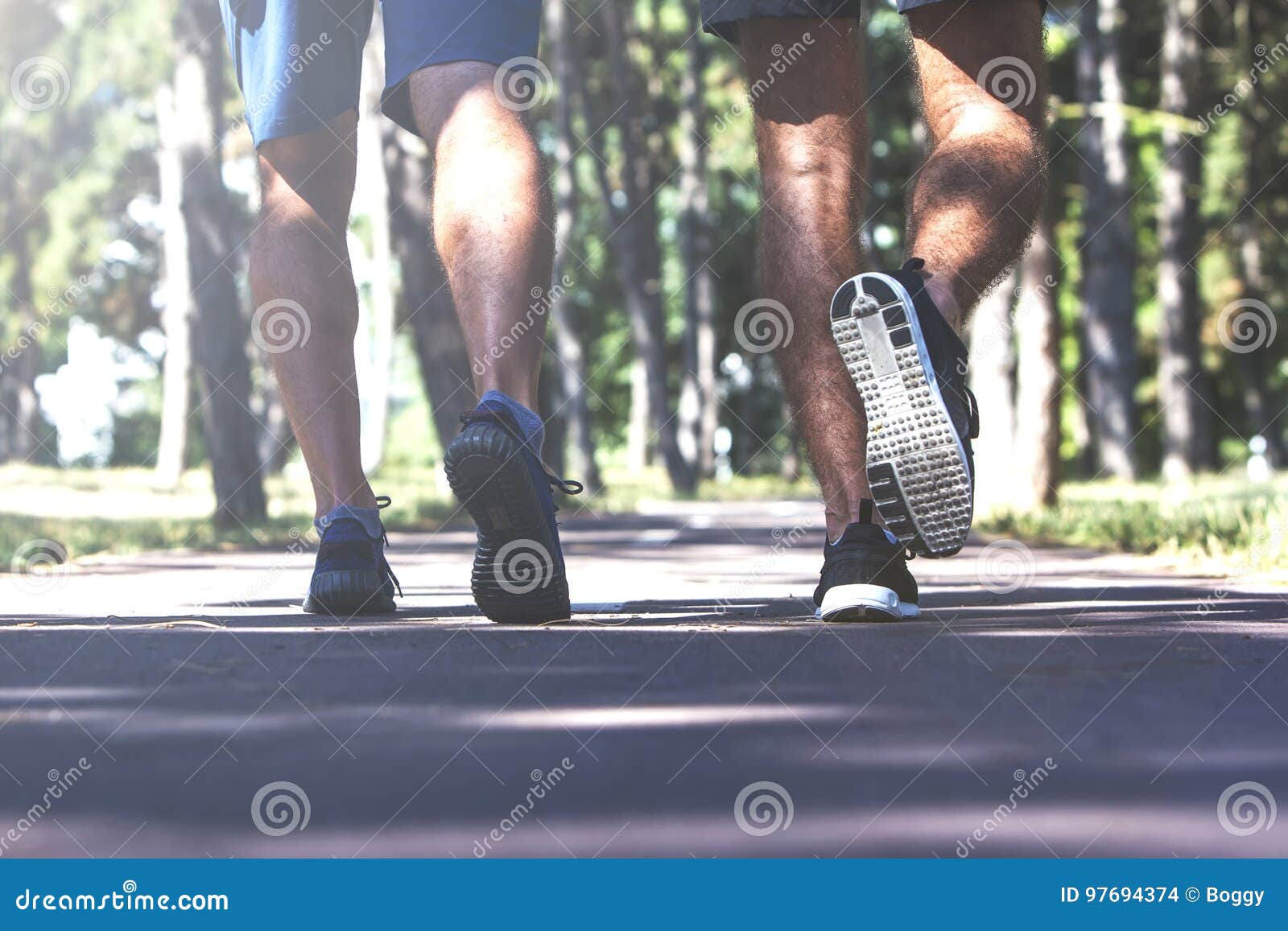 Two Young Men Running in the Park. Stock Photo - Image of together ...