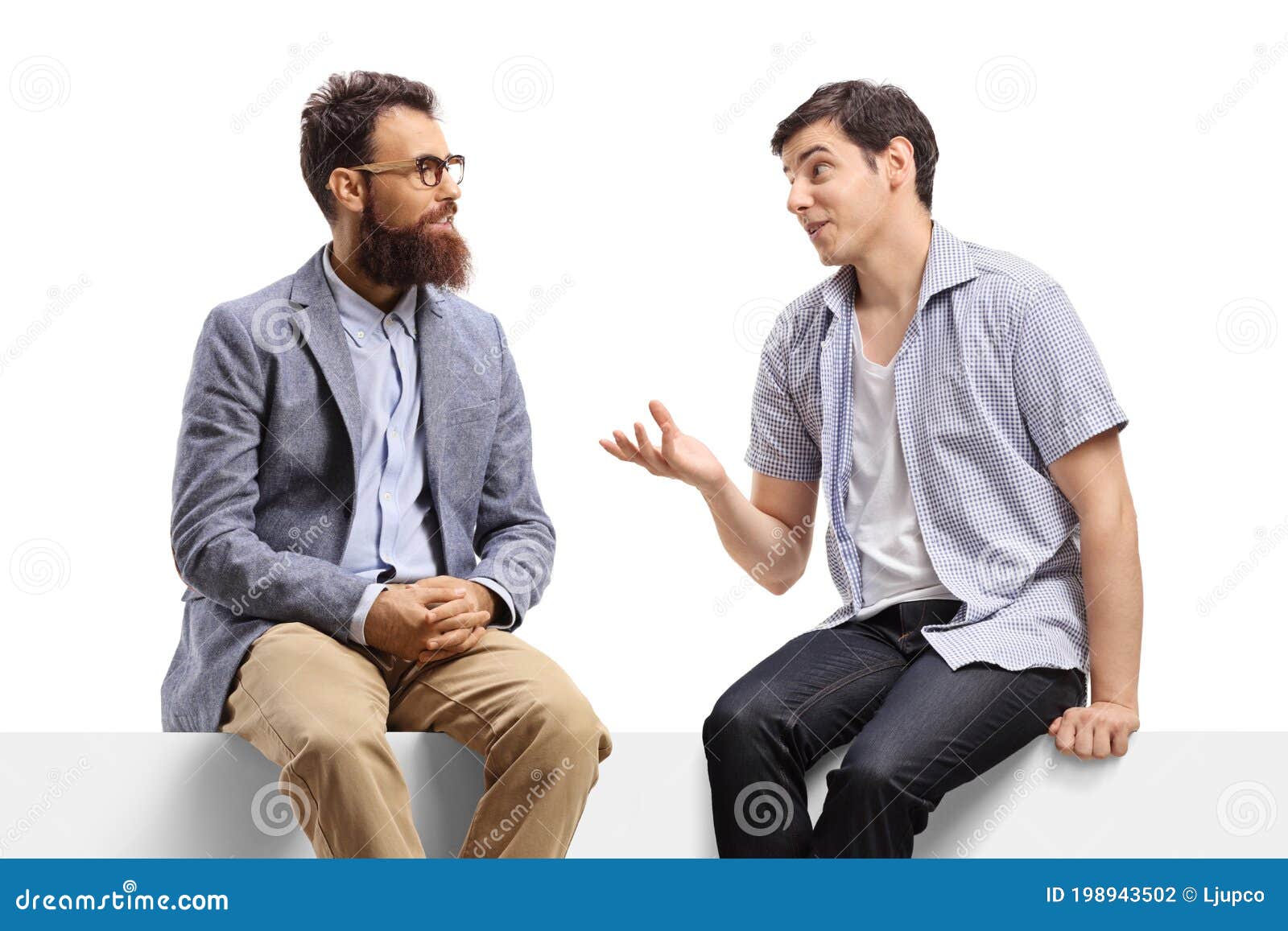 Two Young Men Sitting on a Banner and Talking Stock Photo - Image of ...