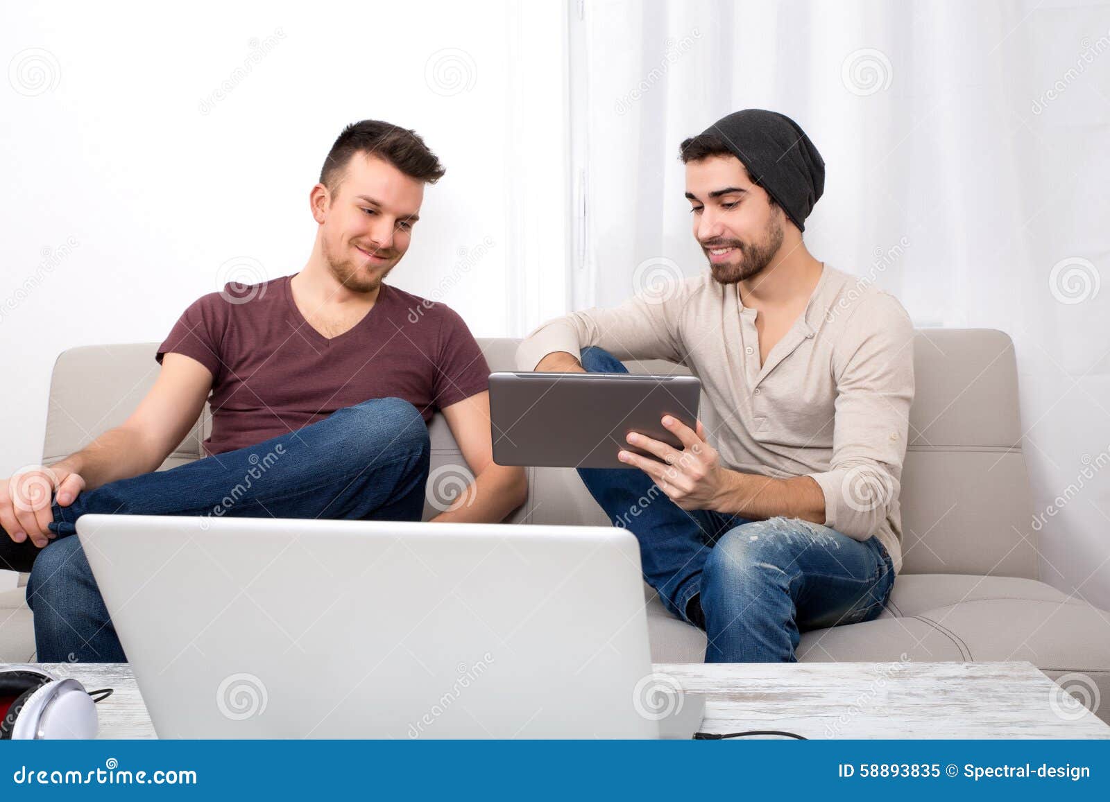 Two Young Men Using a Tablet Pc Stock Image - Image of internet ...