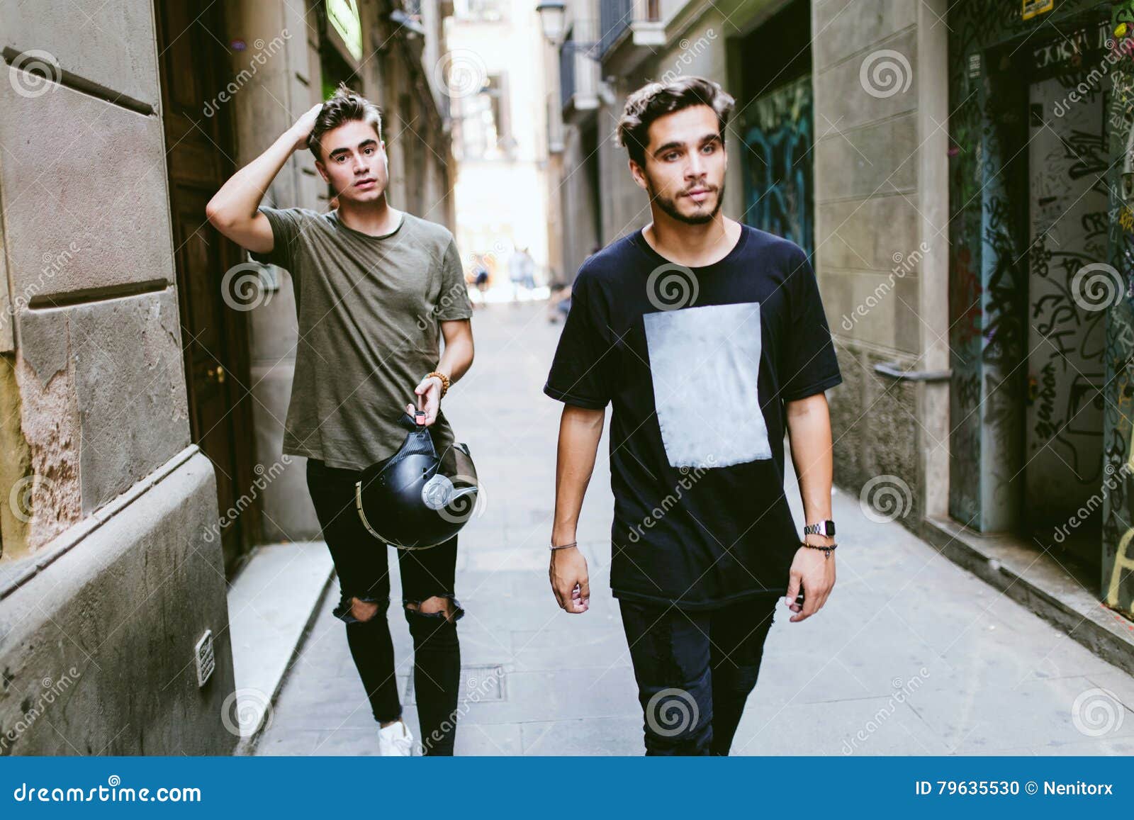 Two Young Men Walking in the Street. Stock Photo - Image of casual ...