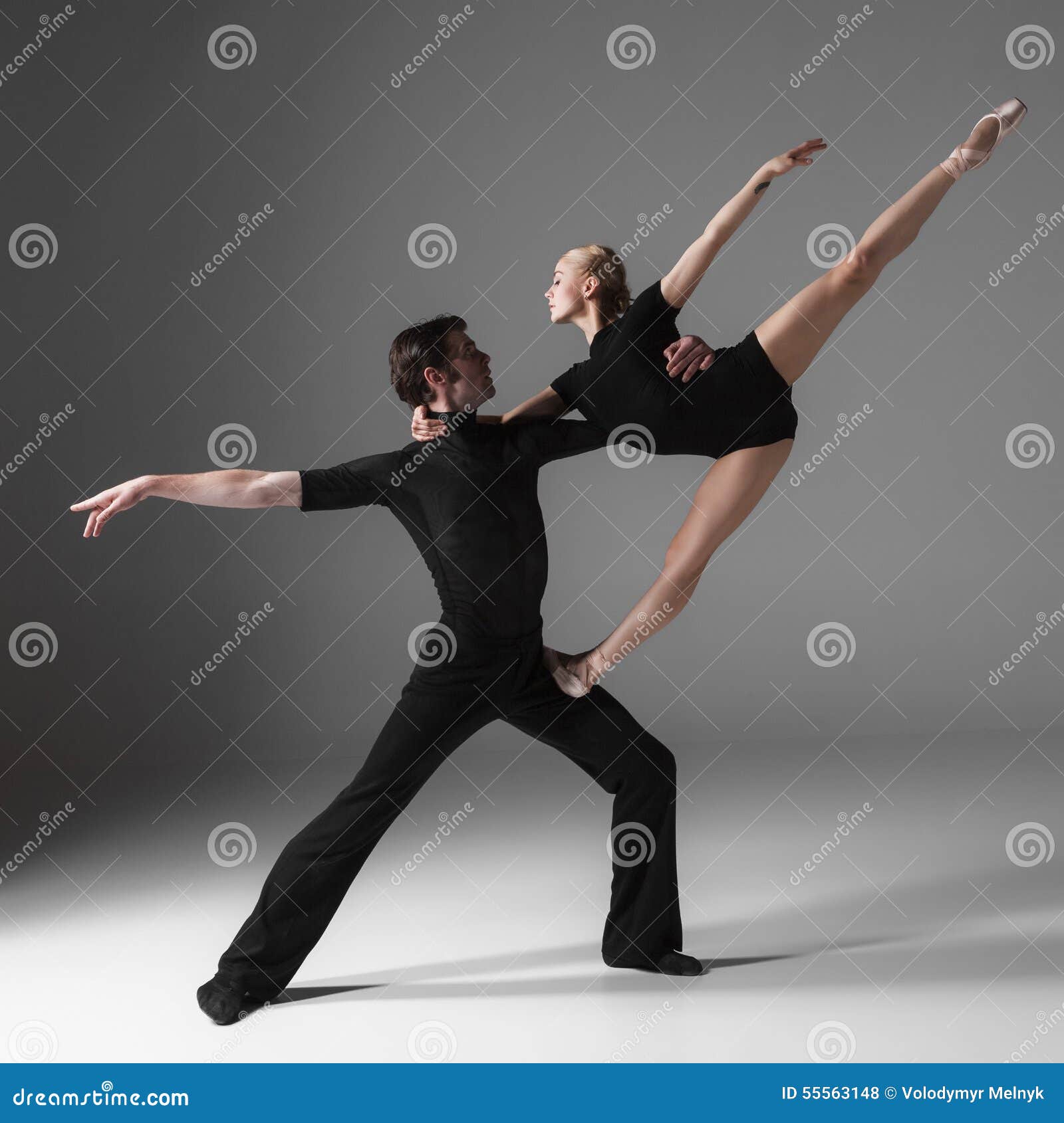 Two Young Modern Ballet Dancers on Gray Studio Stock Photo - Image of ...