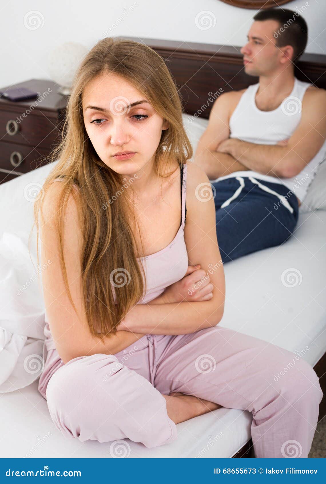 Two Young Partners Upset in Bedroom Stock Image - Image of miserable ...