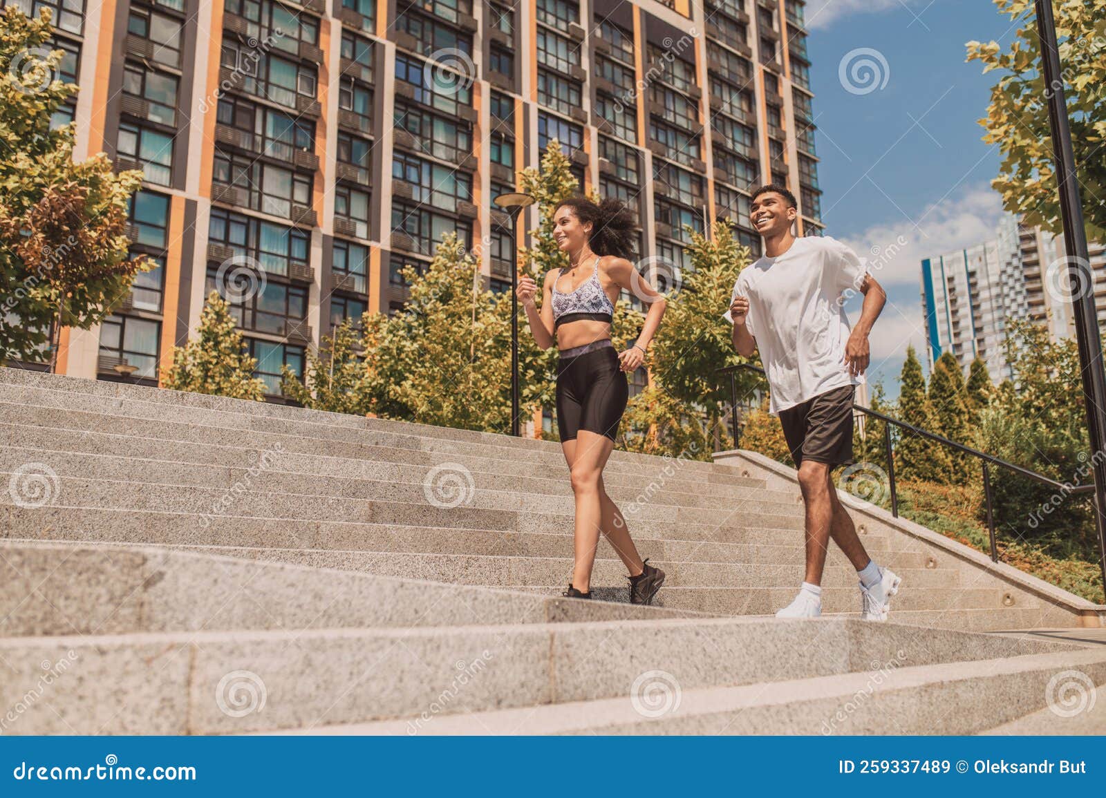 Two Young People Having a Run Together Stock Image - Image of team ...