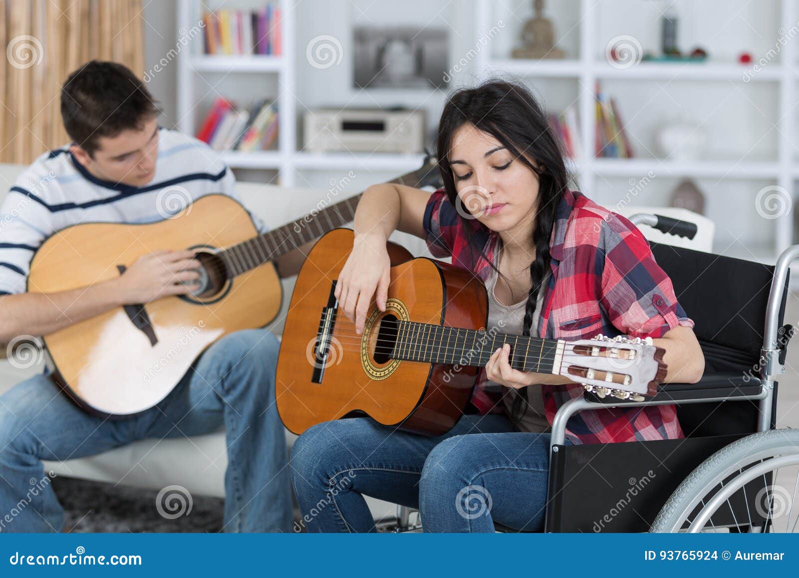 Two Young People Playing Guitars One in Wheelchair Stock Photo - Image ...