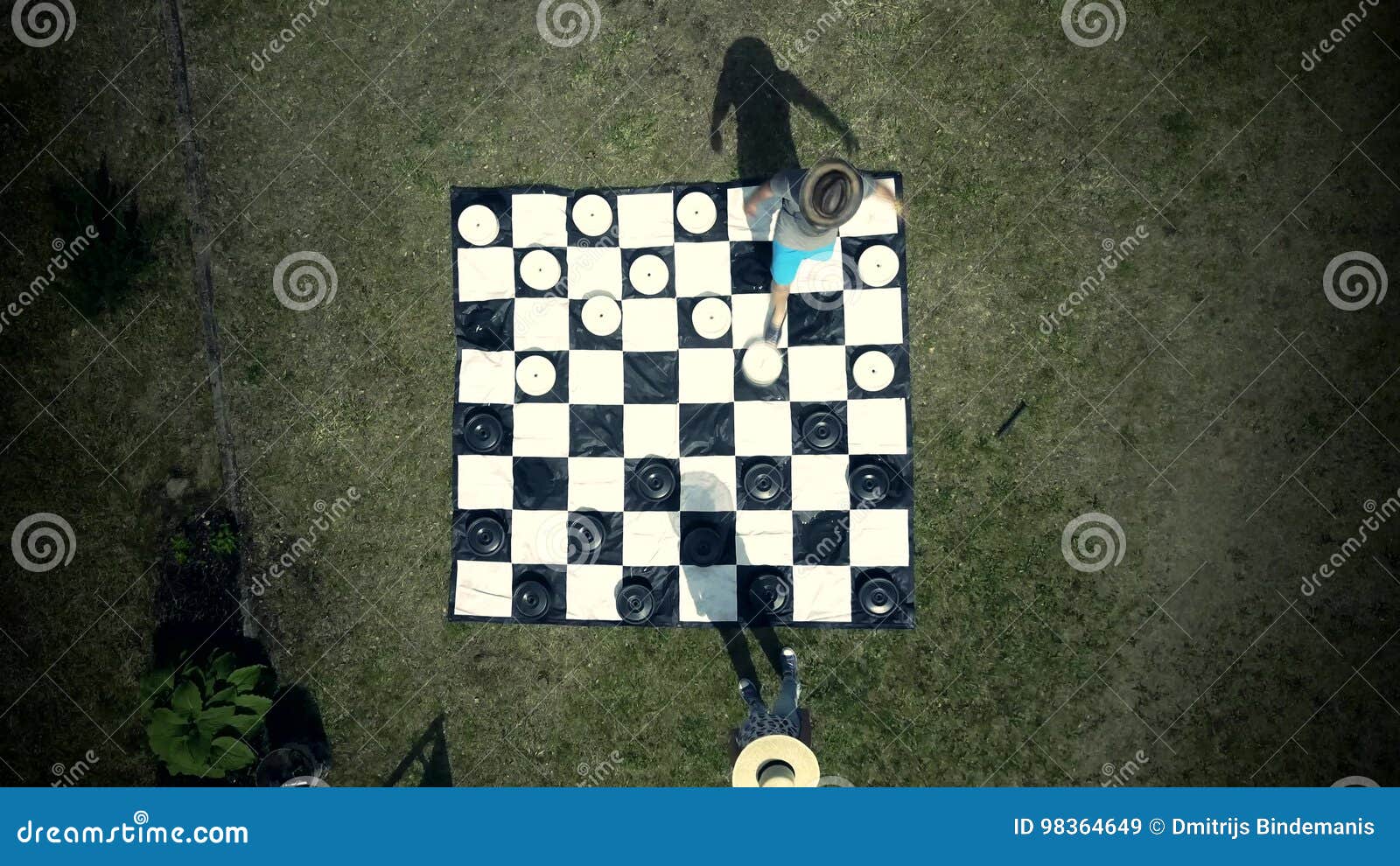 Two Young People are Playing on Huge Checkers. Stock Video - Video of ...