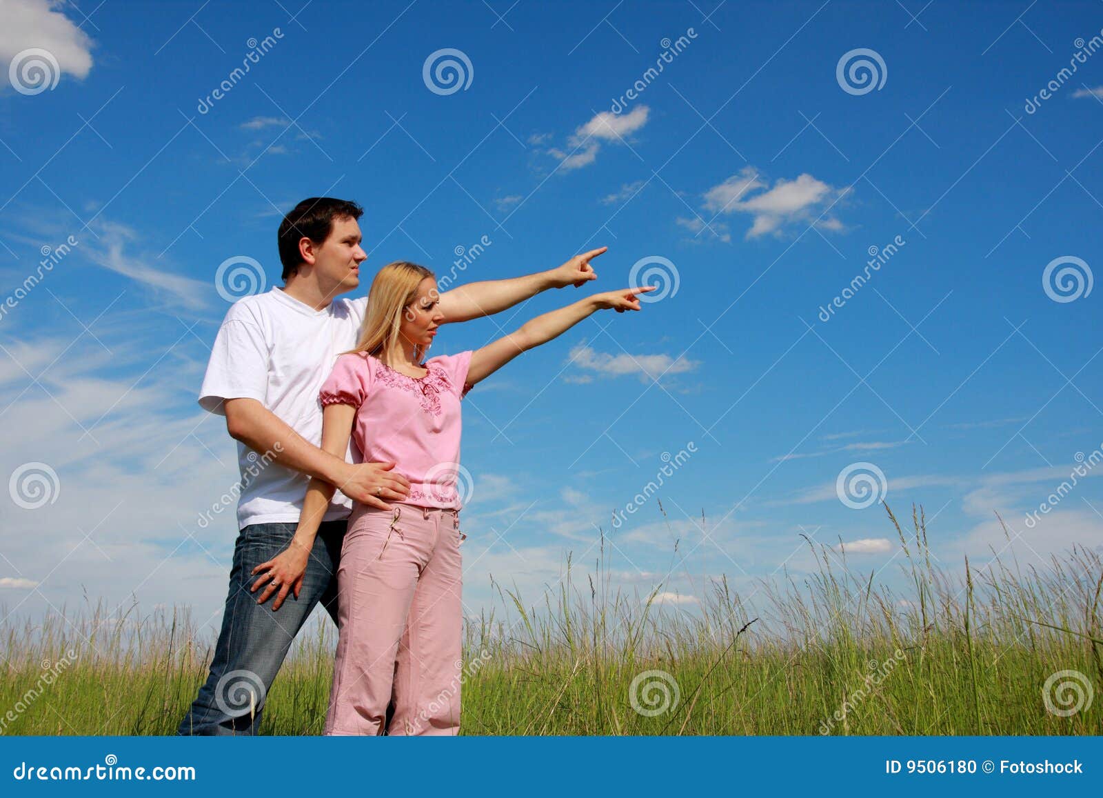 Two Young People Pointing Fingers Stock Photo - Image of show, cloud ...