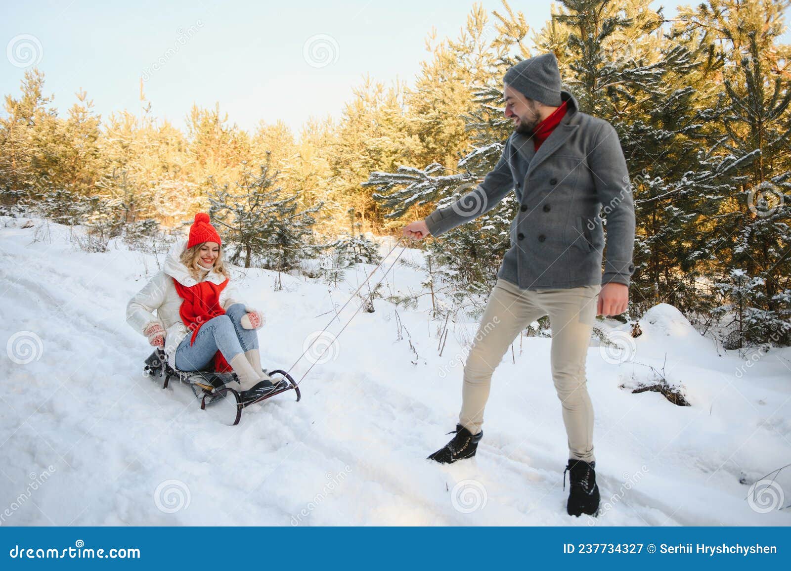 Two Young People Sliding on a Sled Stock Image - Image of season ...