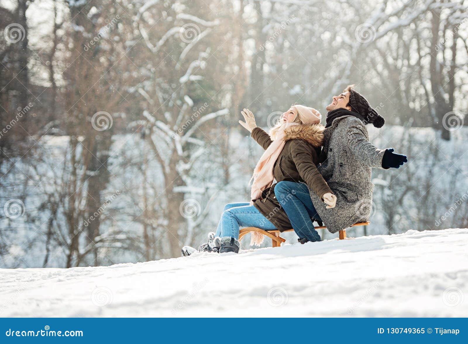 Two Young People Sliding on a Sled Stock Image - Image of cute, sledge ...