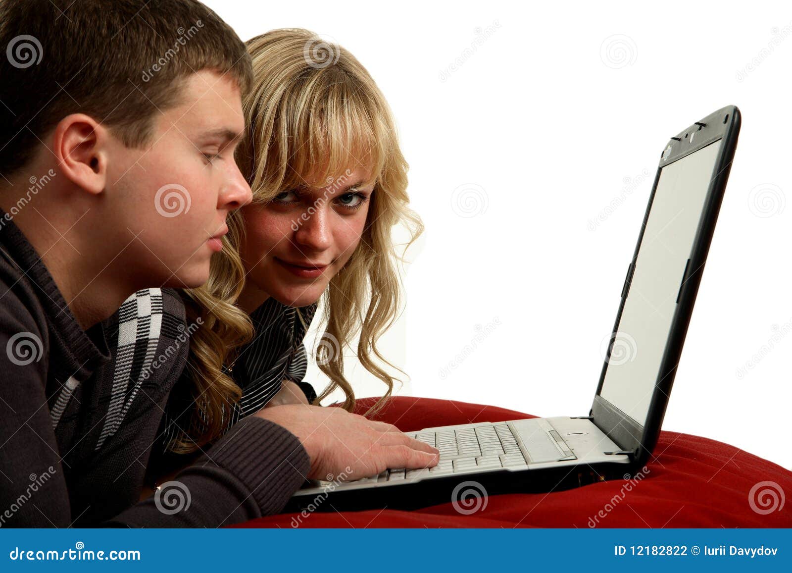 Two Young People Working on a Laptop Computer Stock Photo - Image of ...