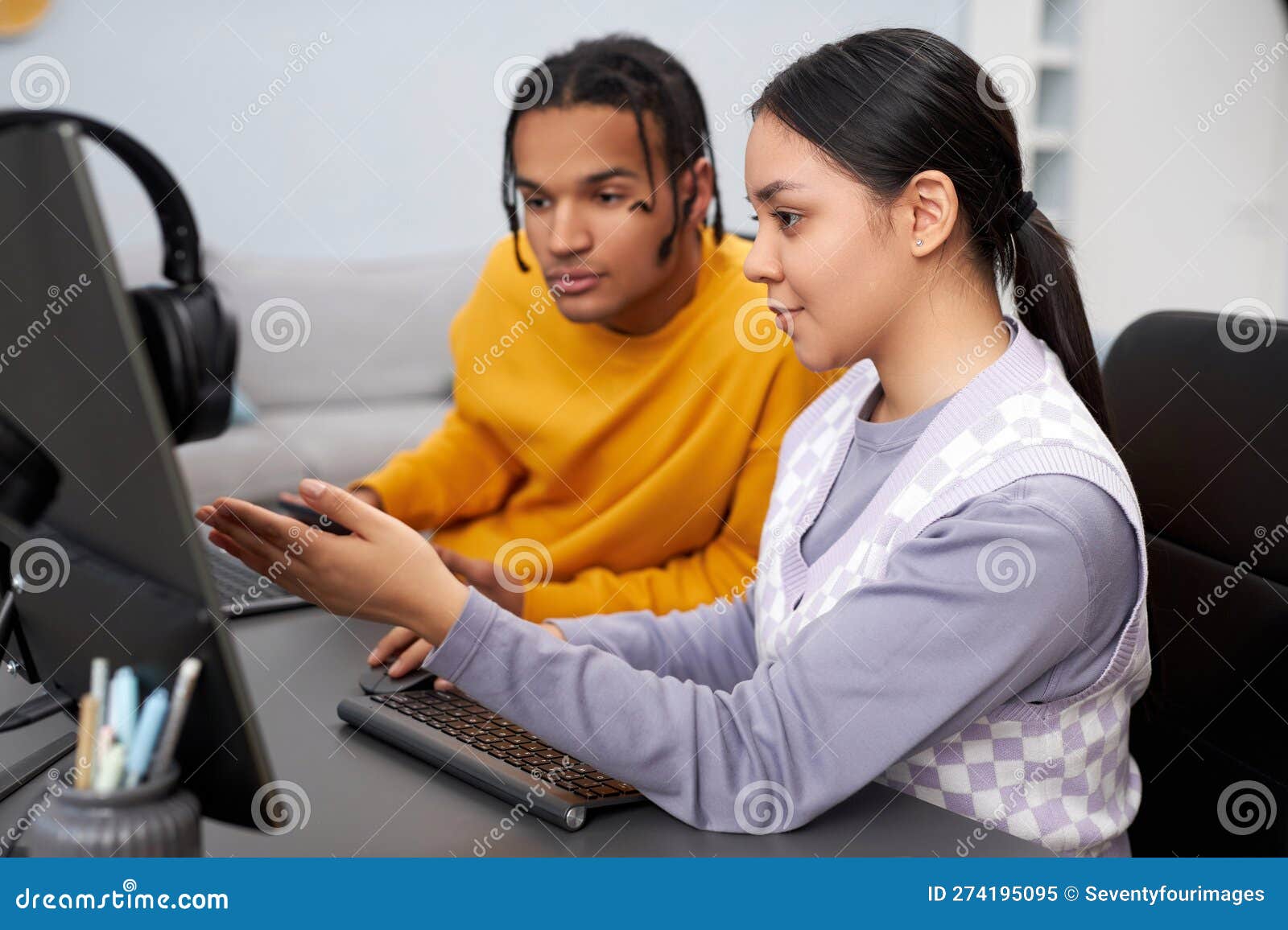 Two Young People Writing Code in Office Woman Pointing at Computer ...