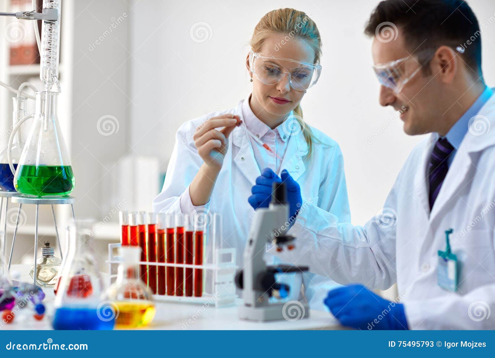 Two Young Scientists Making an Experiment in a Laboratory Stock Image ...