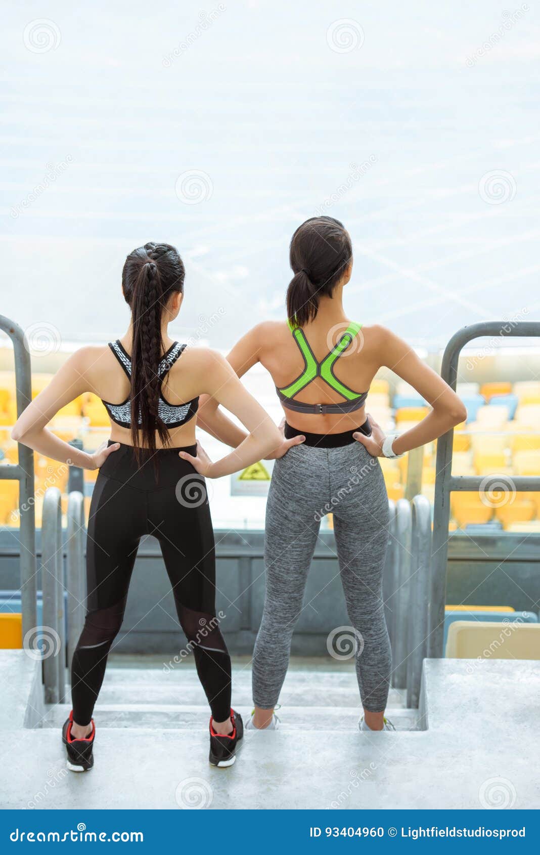 Two Young Sportswomen Standing on Stadium Ready for Training Stock ...