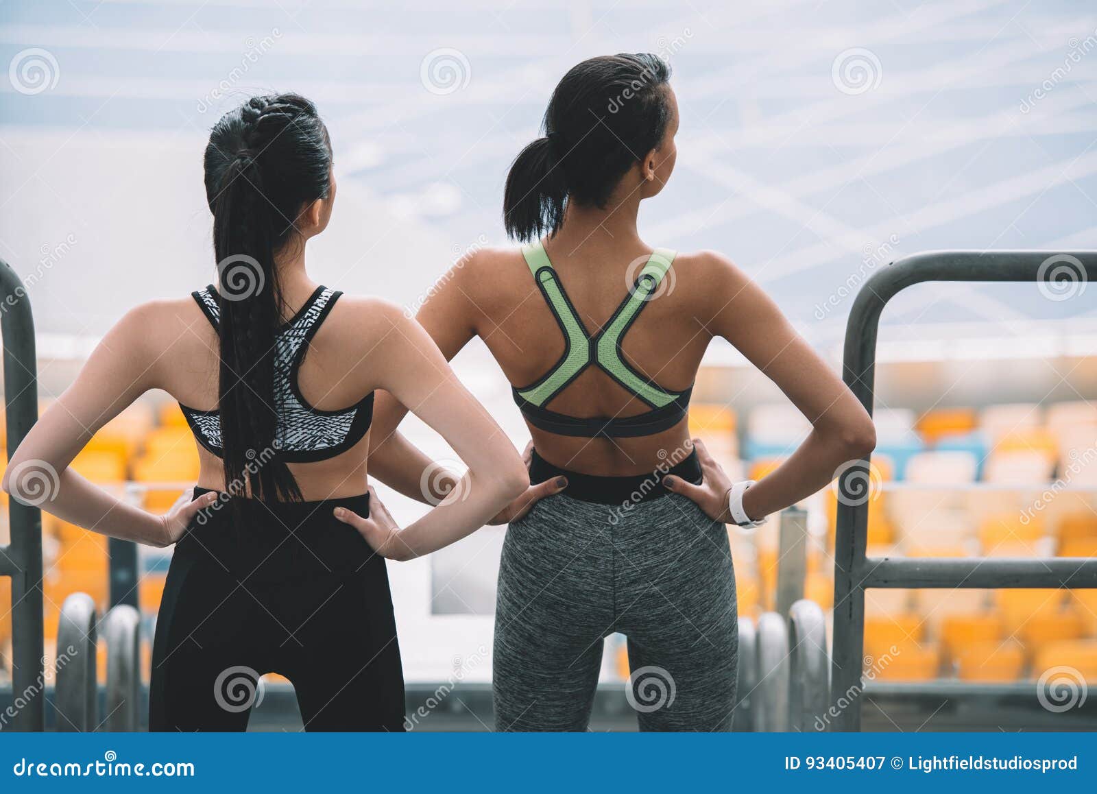 Two Young Sportswomen Standing on Stadium Ready for Training Stock ...