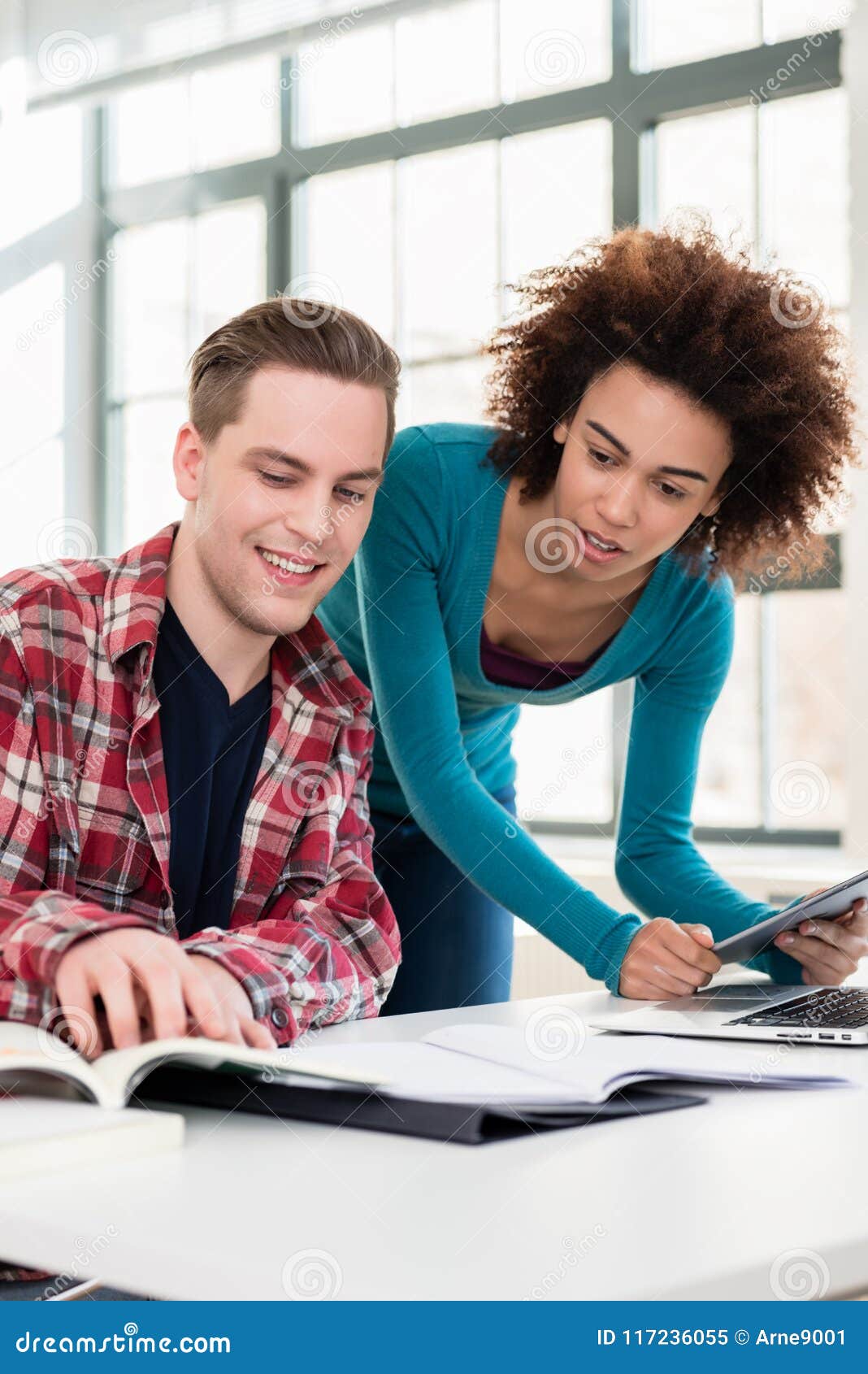 Two Young Students Browsing Internet for Online Useful Information ...