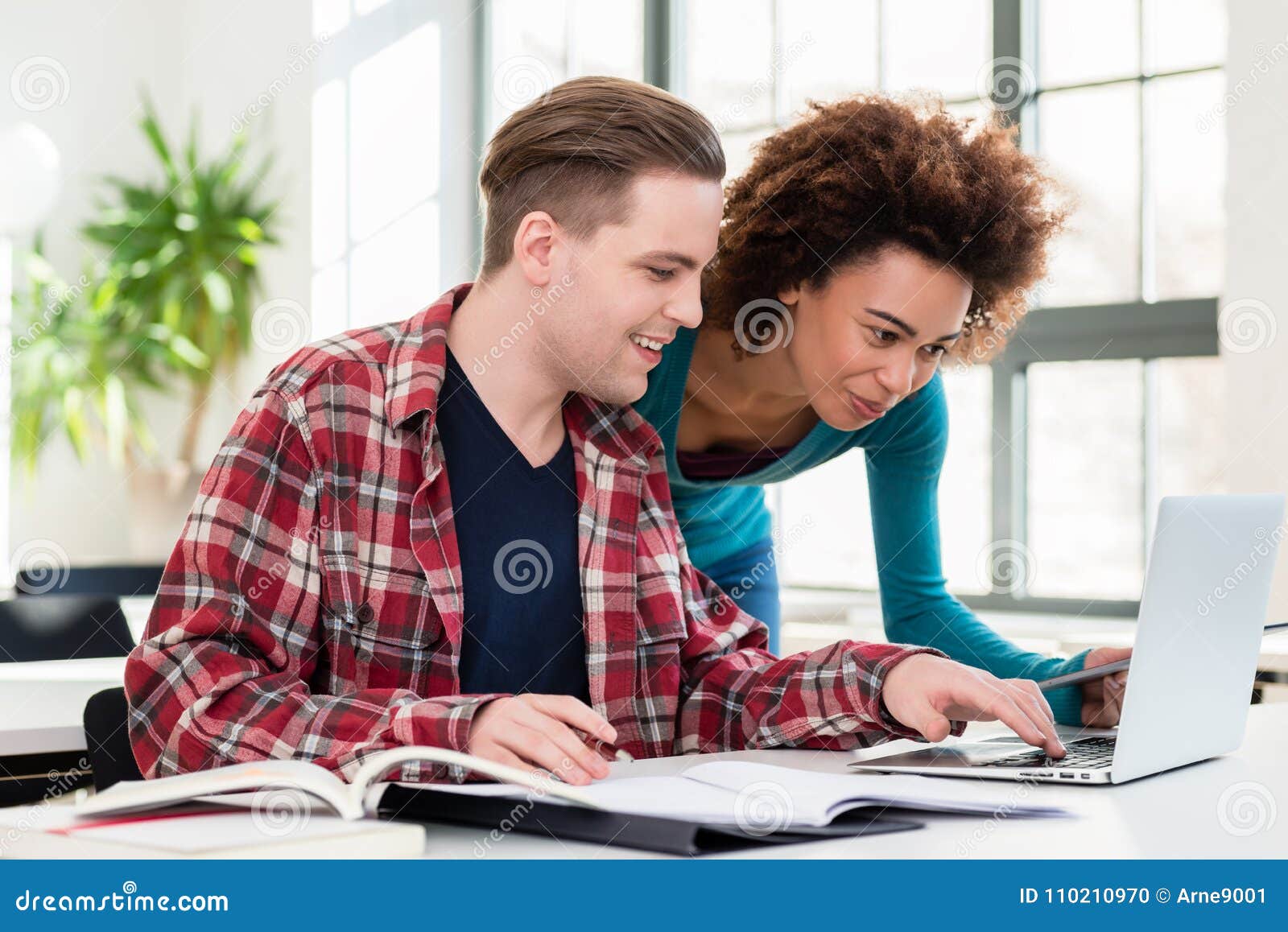 Two Young Students Browsing Internet for Online Useful Information ...