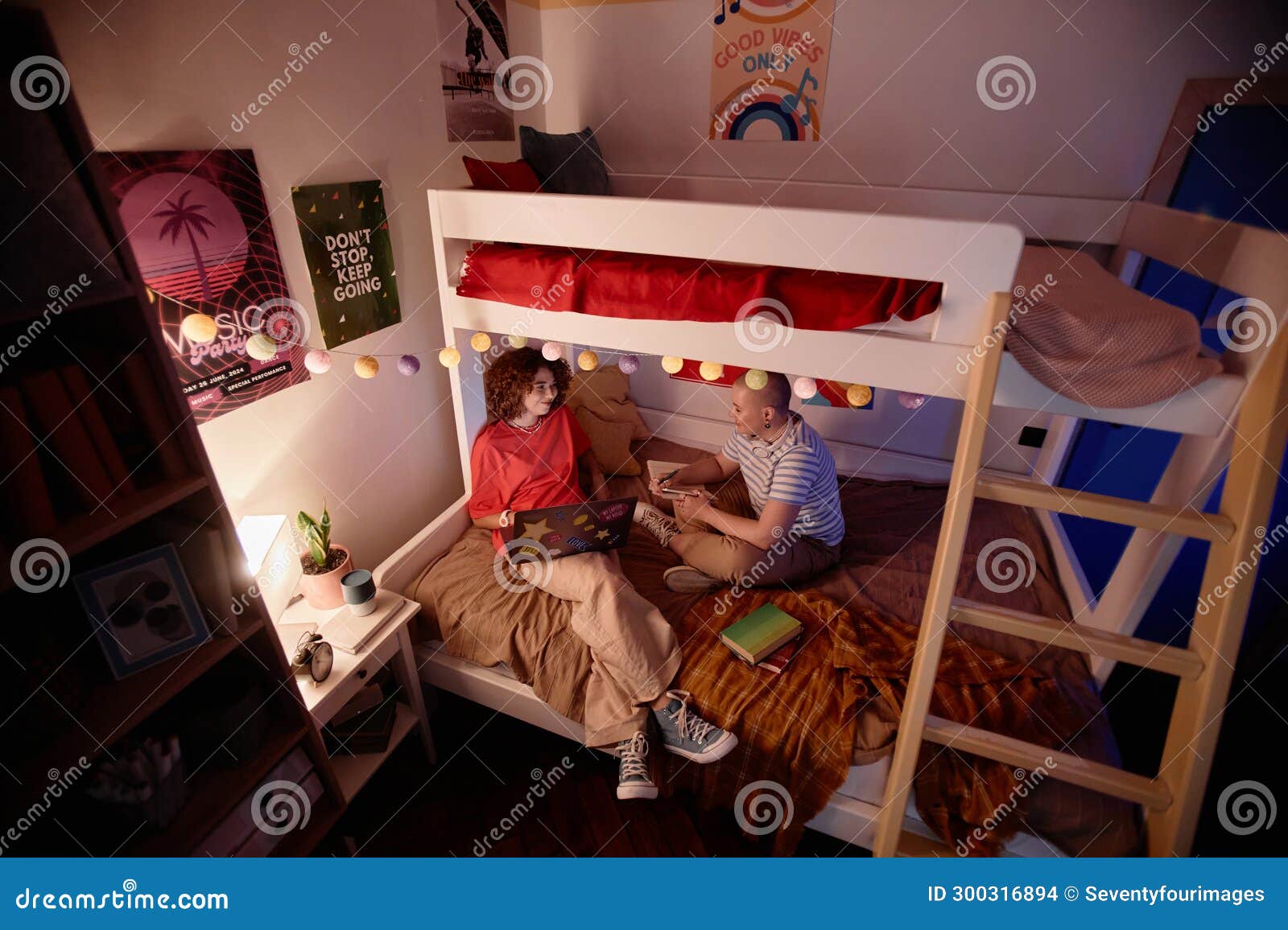 Two Young Students Doing Homework Together on Bunk Bed Stock Photo ...