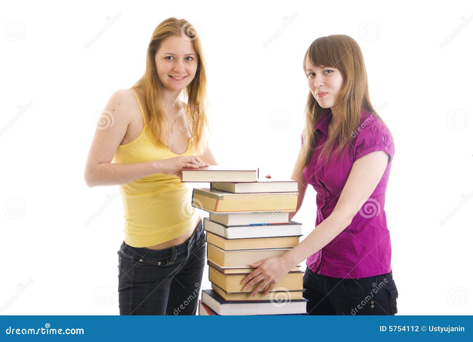 The Two Young Students Isolated On A White Picture. Image: 5754112