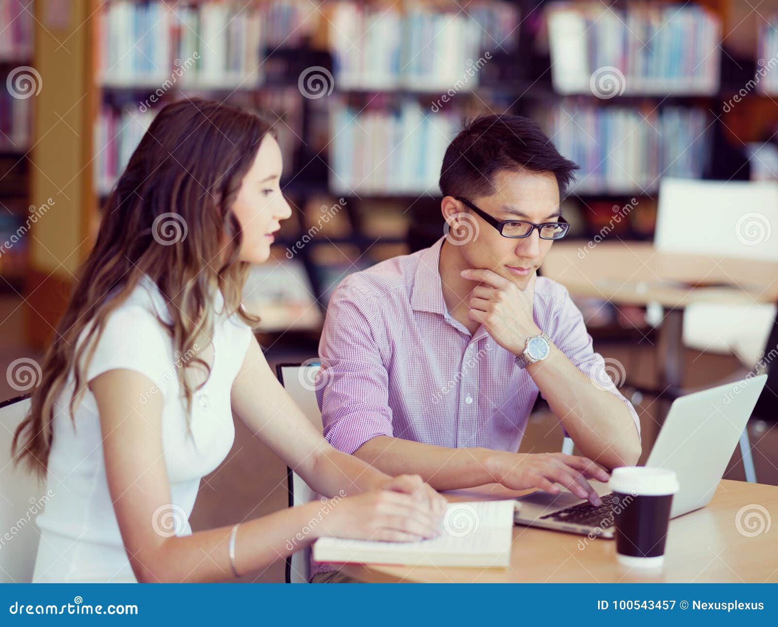 Two Young Students at the Library Stock Image - Image of notebook ...