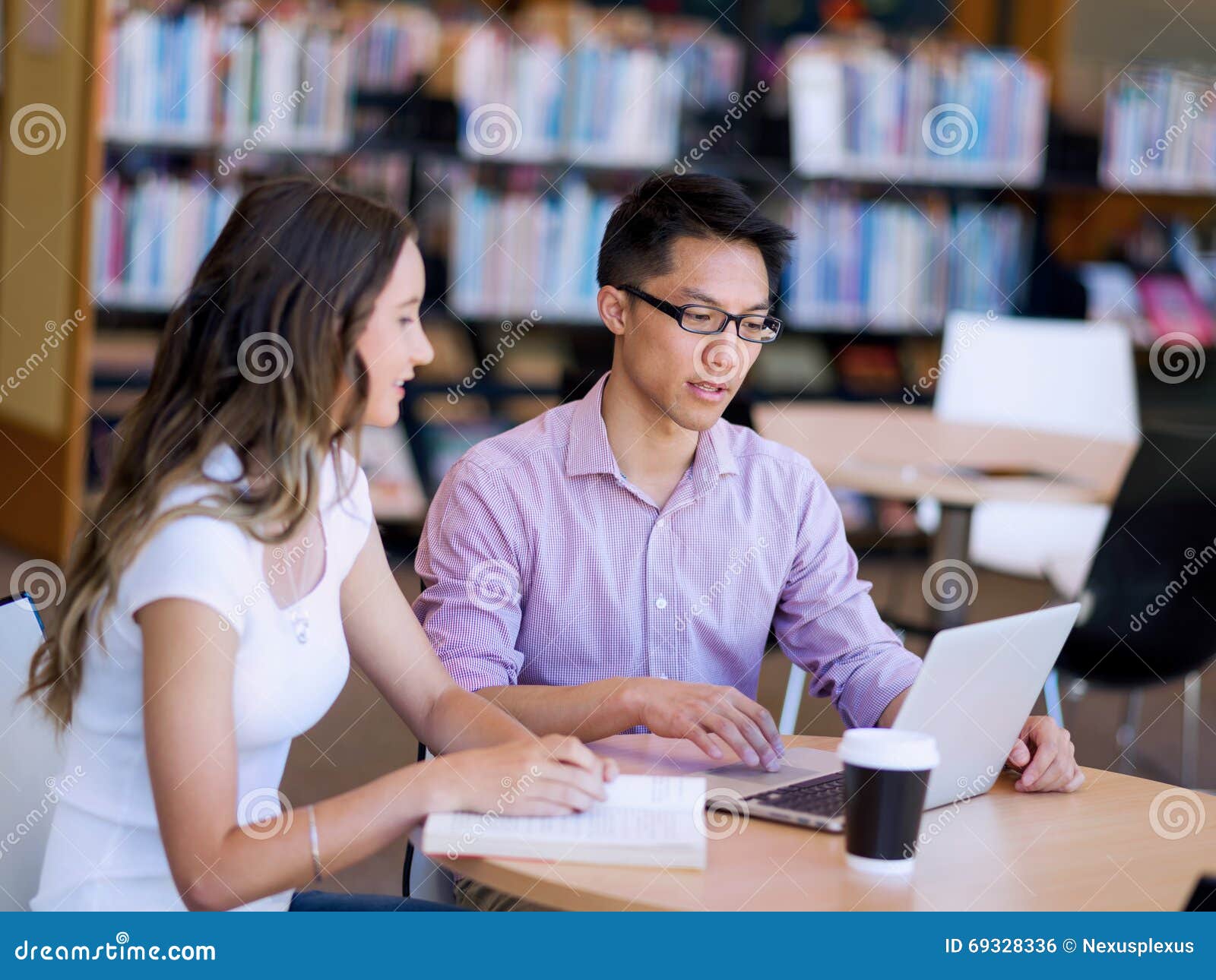 Two Young Students at the Library Stock Photo - Image of couple ...