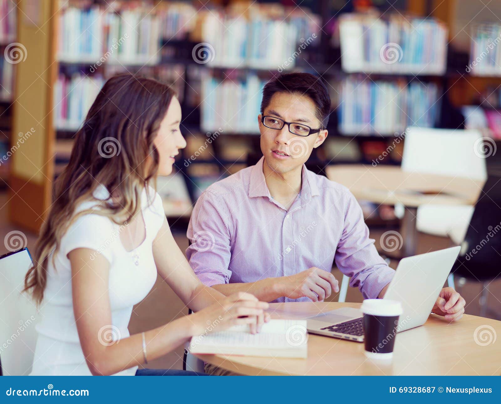 Two Young Students at the Library Stock Image - Image of library ...