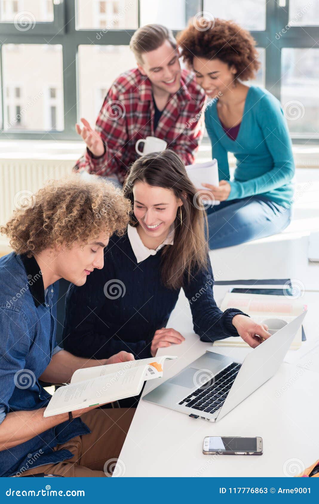 Two Young Students Searching for an Answer To Their Question Stock ...