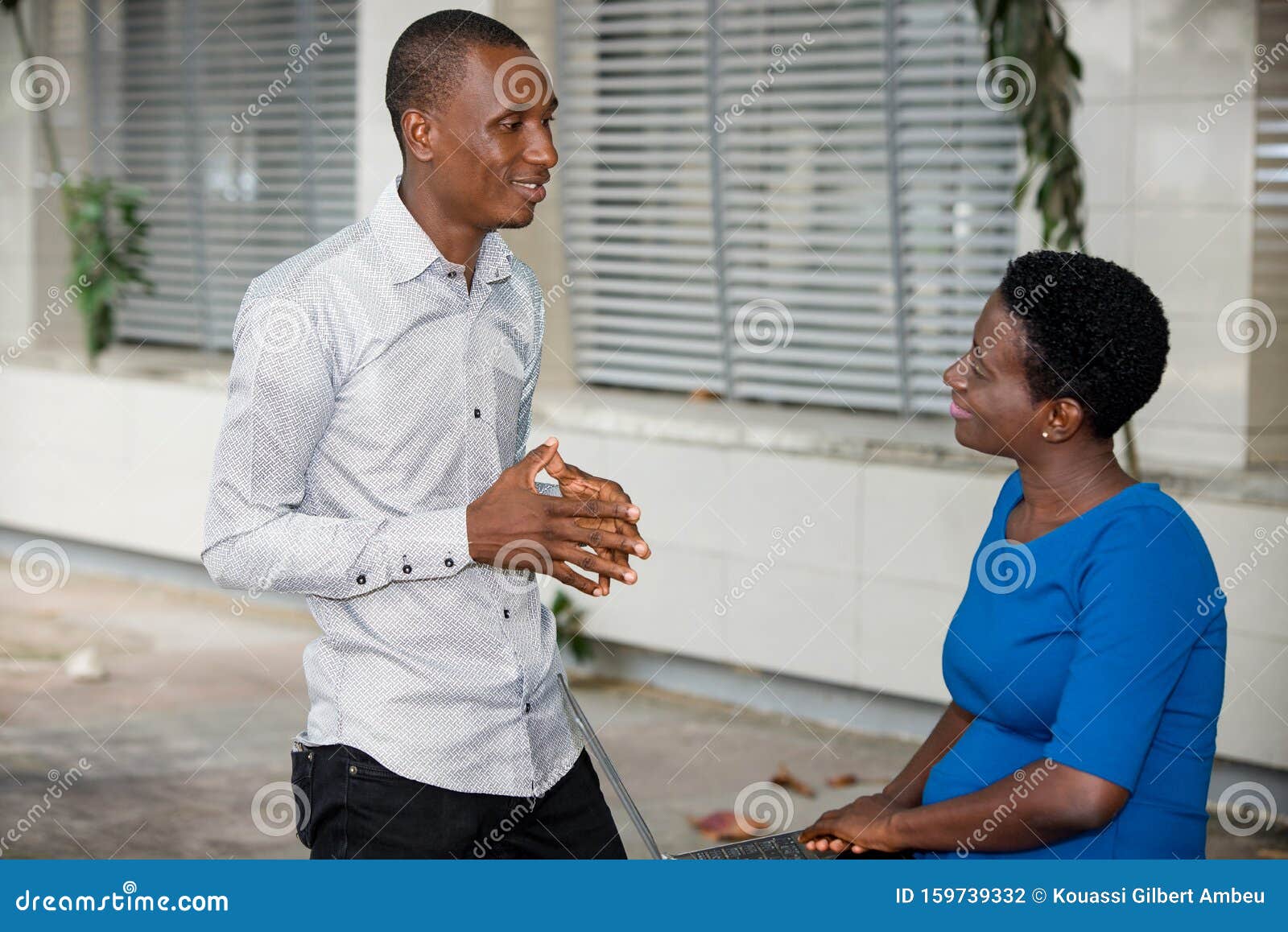 Two Young Students Talking Outside after Classes Stock Photo - Image of ...