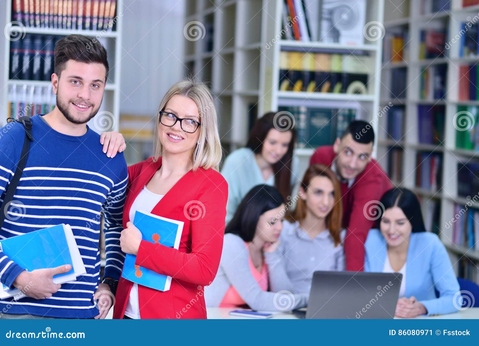 Two Young Students Working Together at the Library Stock Image - Image ...