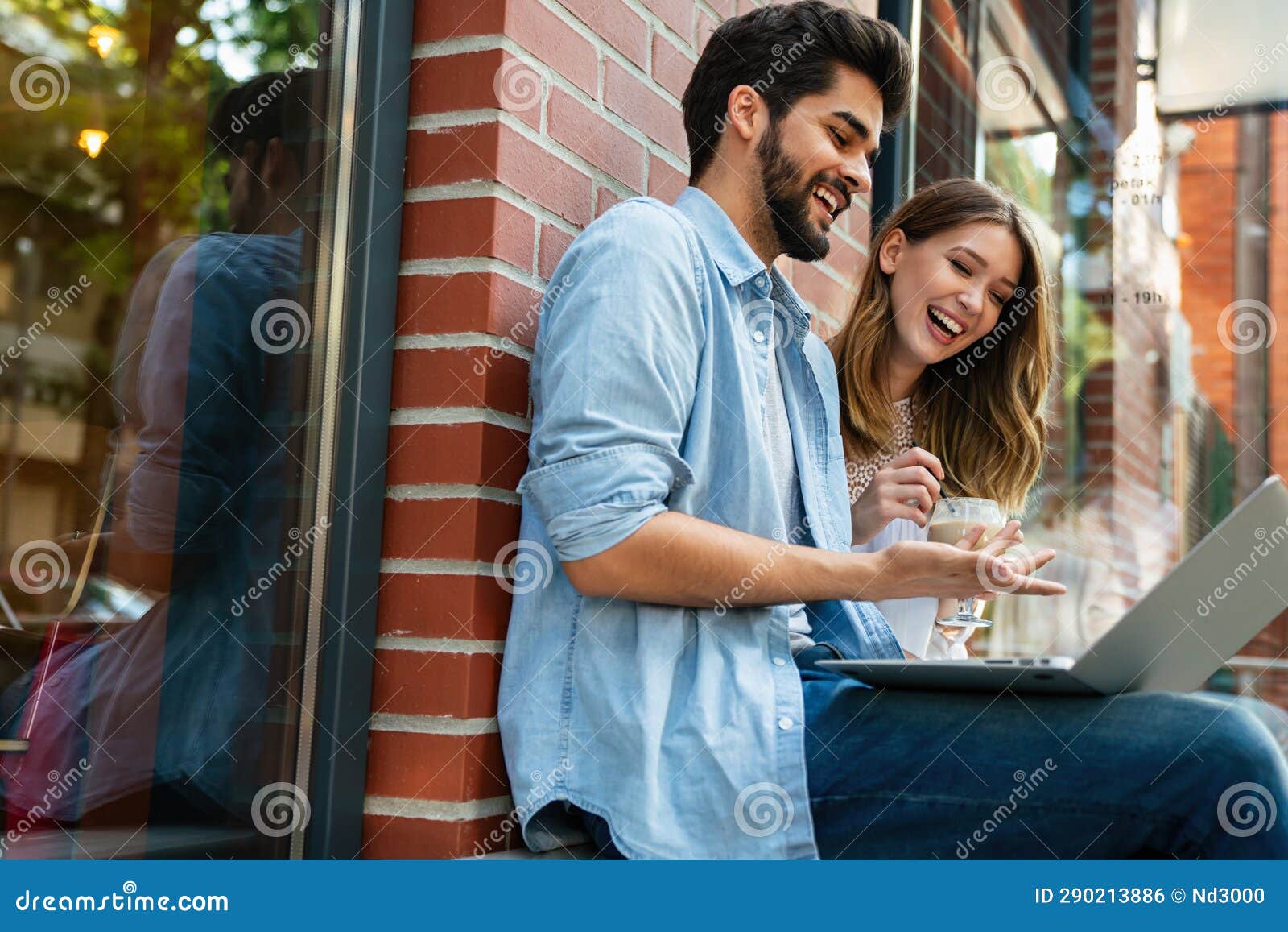 Two Young Successful Business Colleagues Talking, Working Together ...