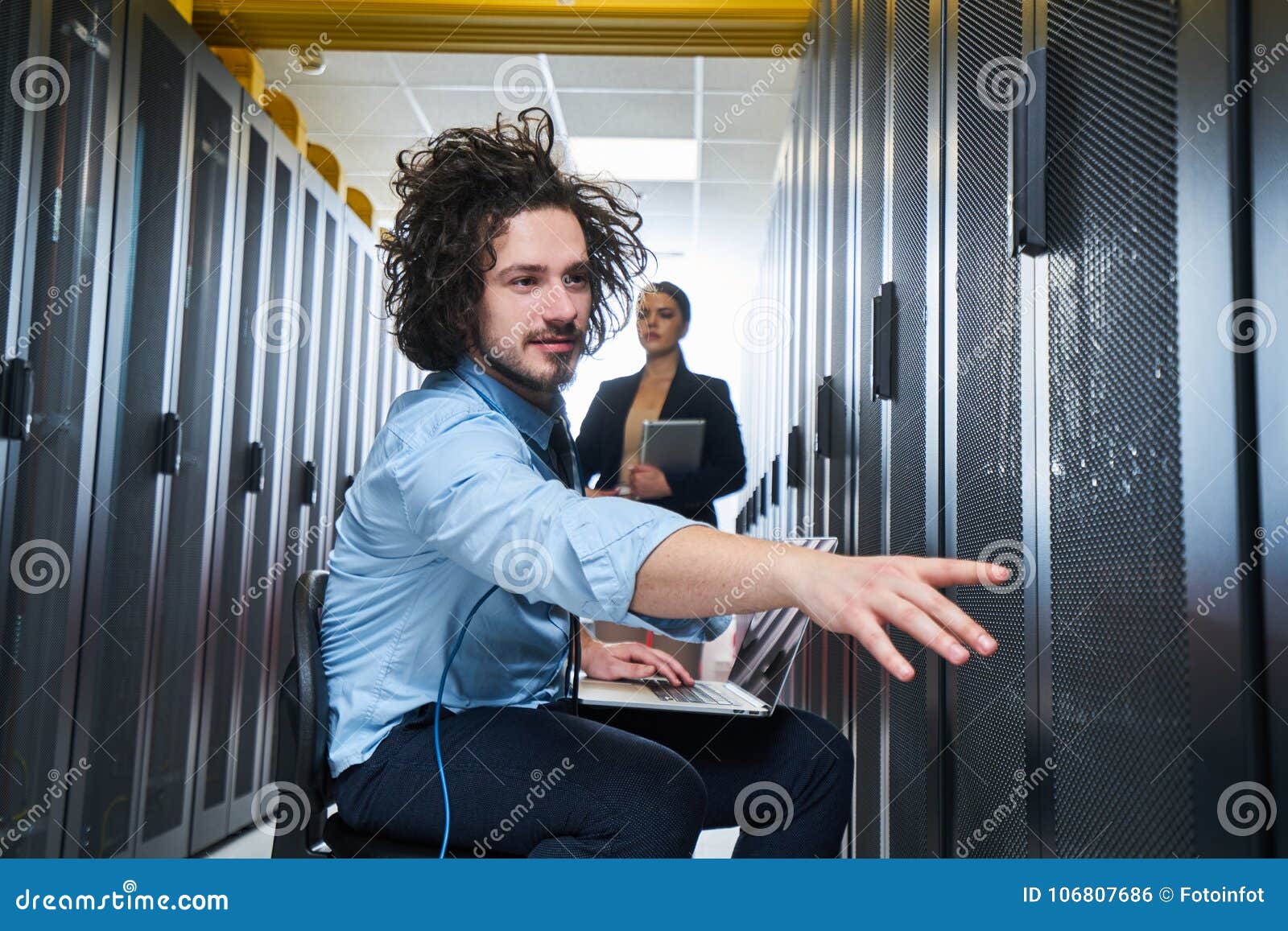 Two Young Technicans Working Stock Photo - Image of business, center ...
