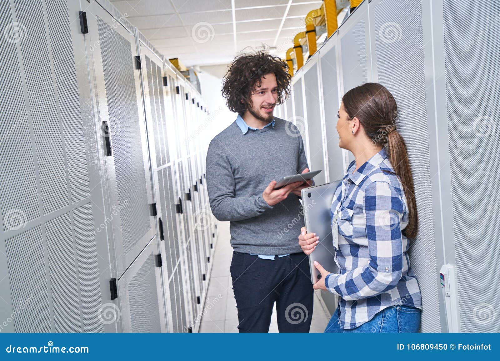Two Young Technicans Working Stock Photo - Image of connection ...