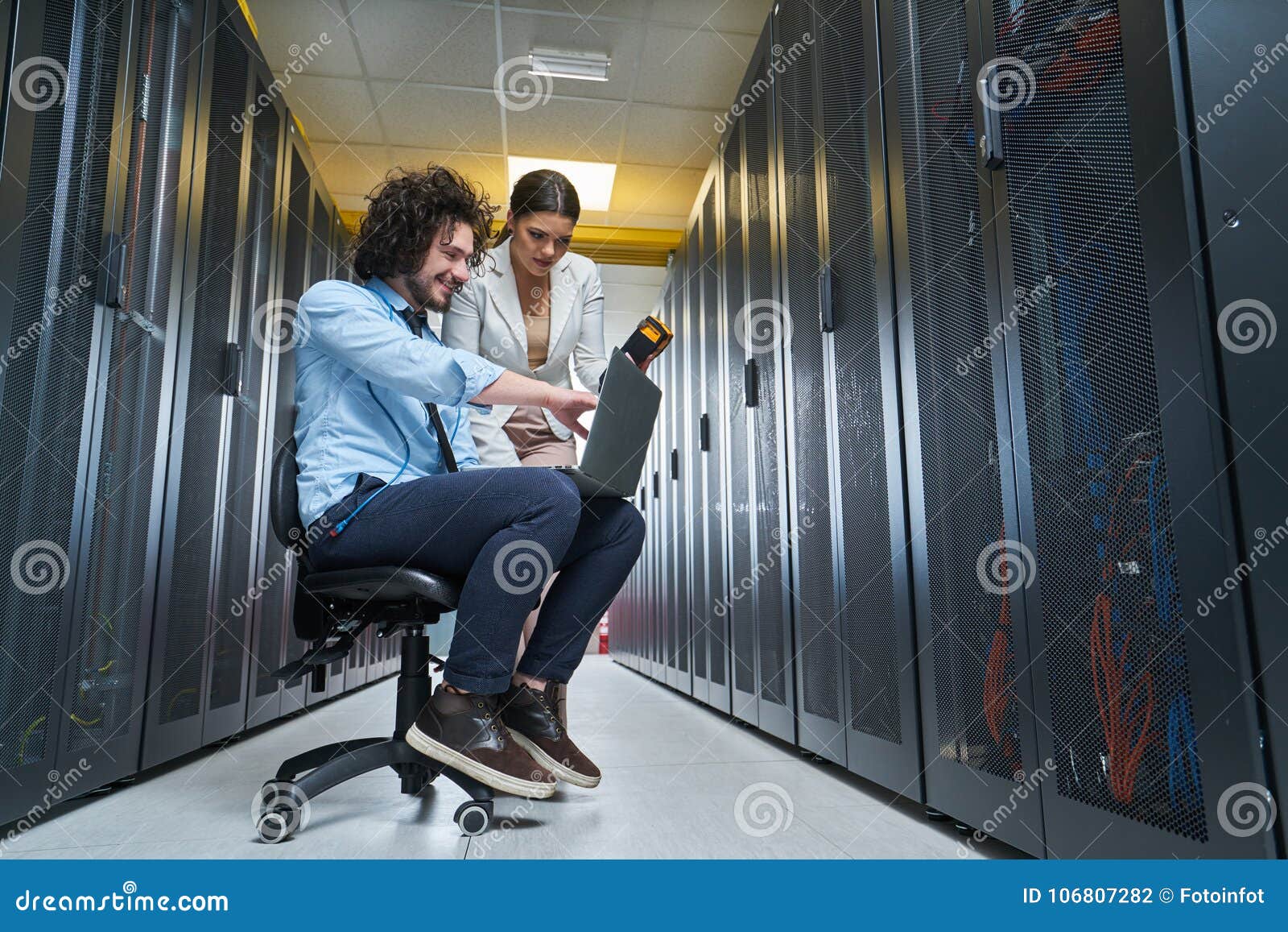 Two Young Technicans Working Stock Photo - Image of male, maintenance ...