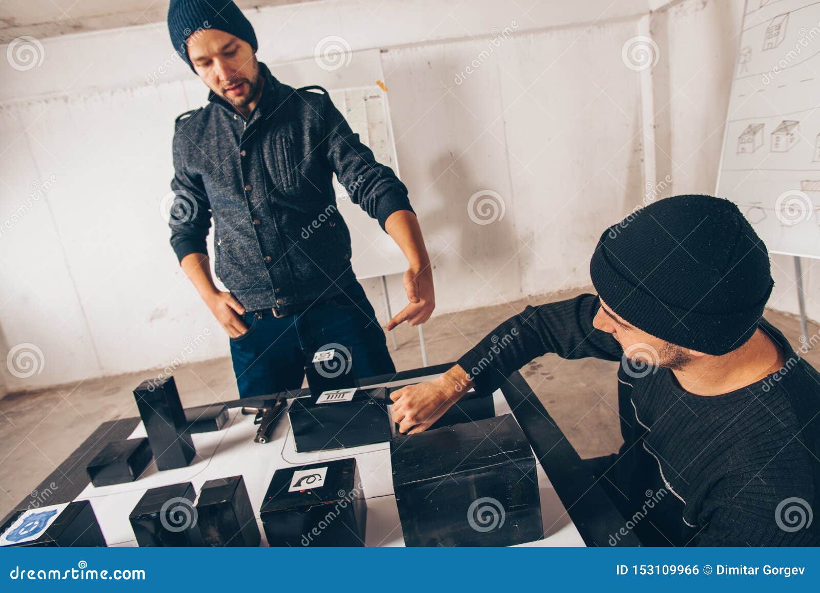 Thiefs planning a heist stock photo. Image of danger - 153109966