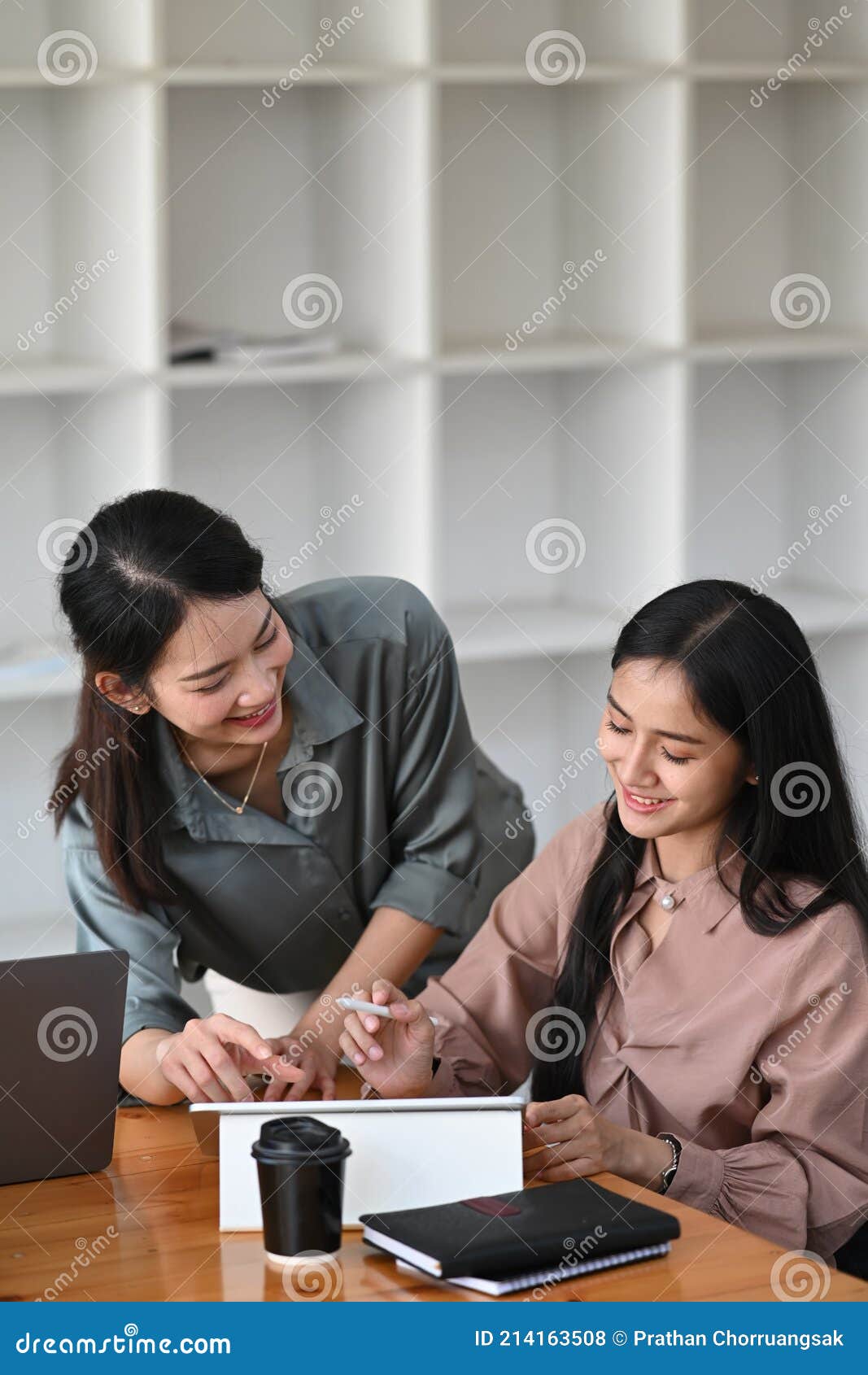 Two Woman Office Worker Talking and Working Together in Office. Stock ...