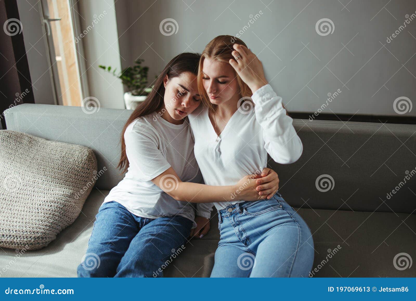 Two Young Women Cuddling in Living Room Stock Image - Image of female ... Two Young Women Cuddling in Living Room Stock Image - Image of female ...