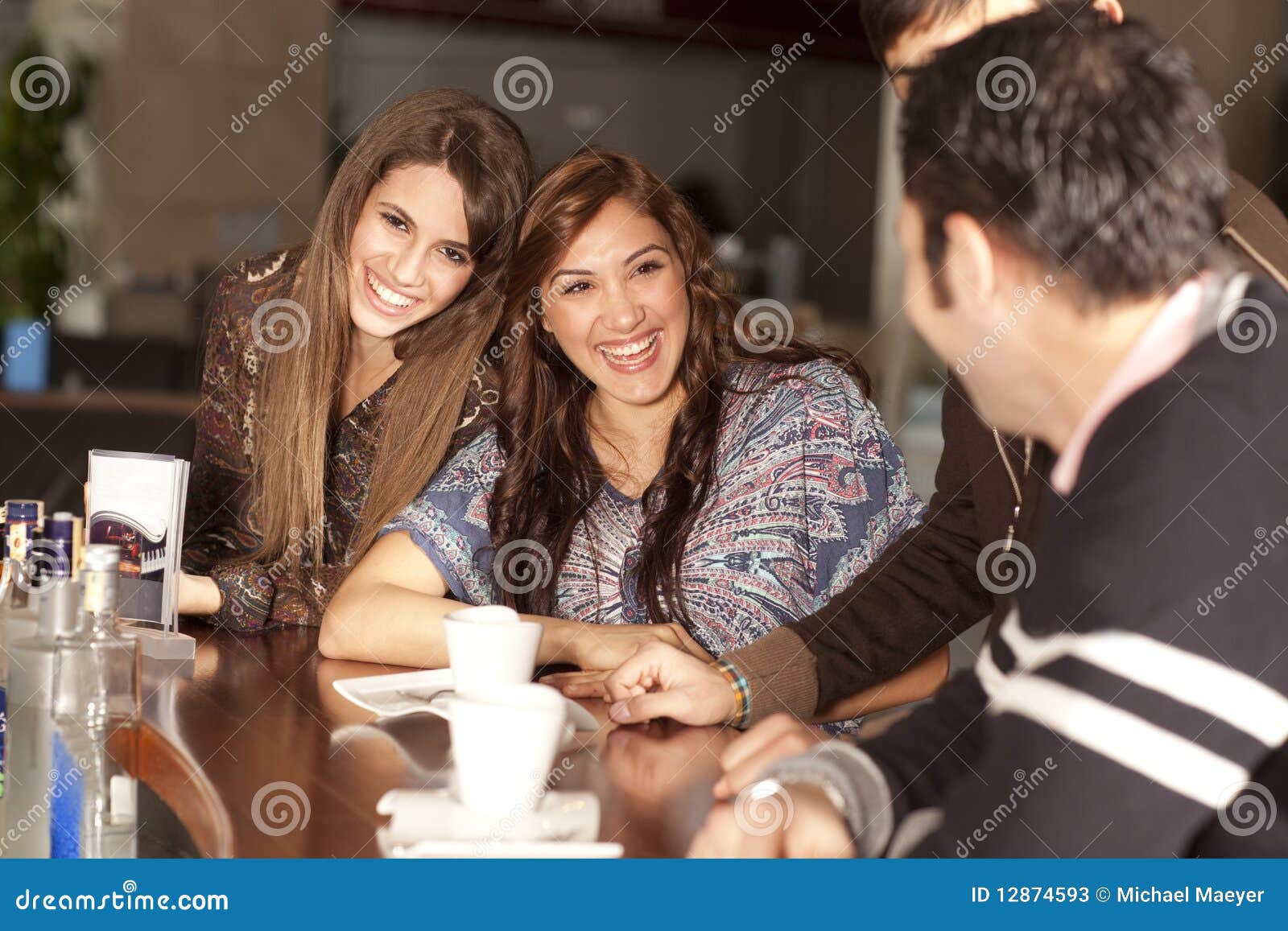 Two Young Women Flirting at a Bar Stock Image - Image of colour ...